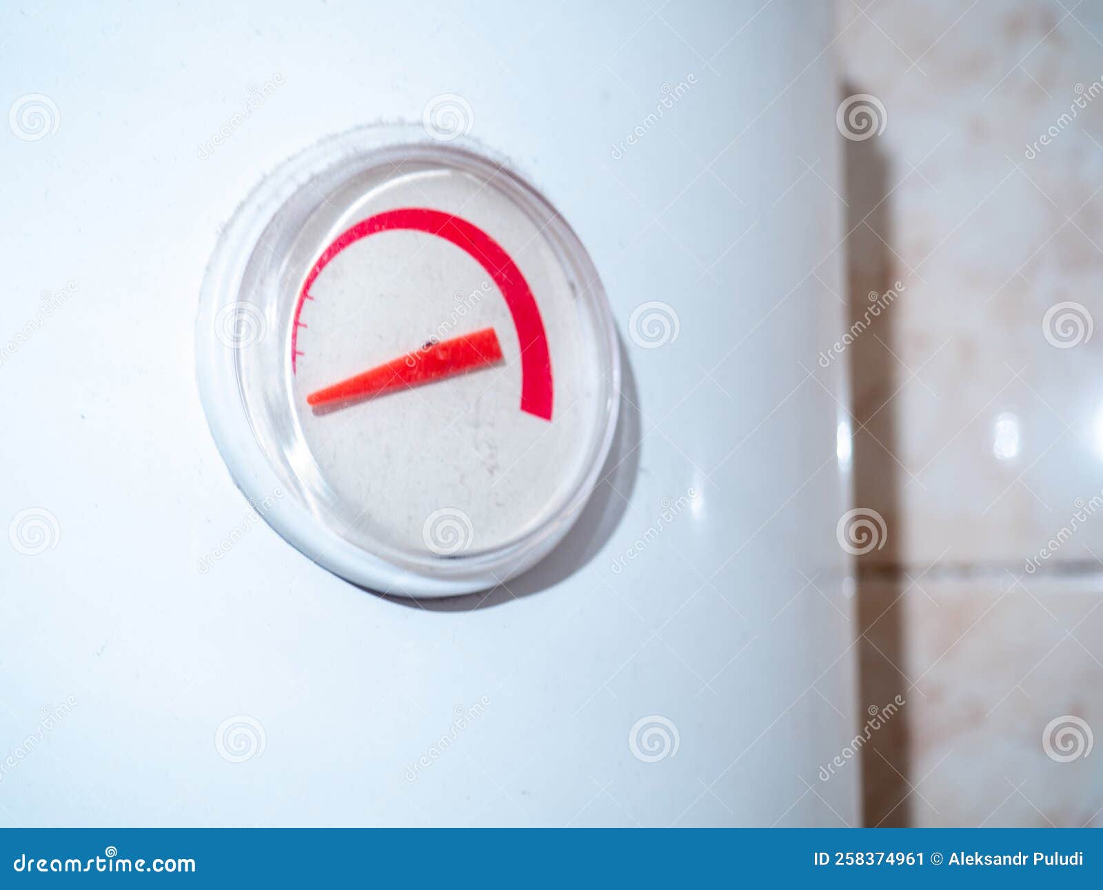 The Dial on the Water Heater. Appliance in the Bathroom. Titanium ...