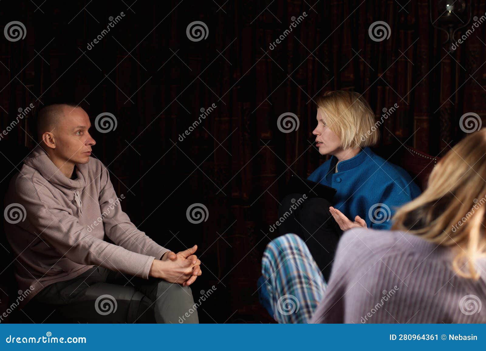 Dialogue, Interview with a Blogger in a Dark Room. a Woman is ...