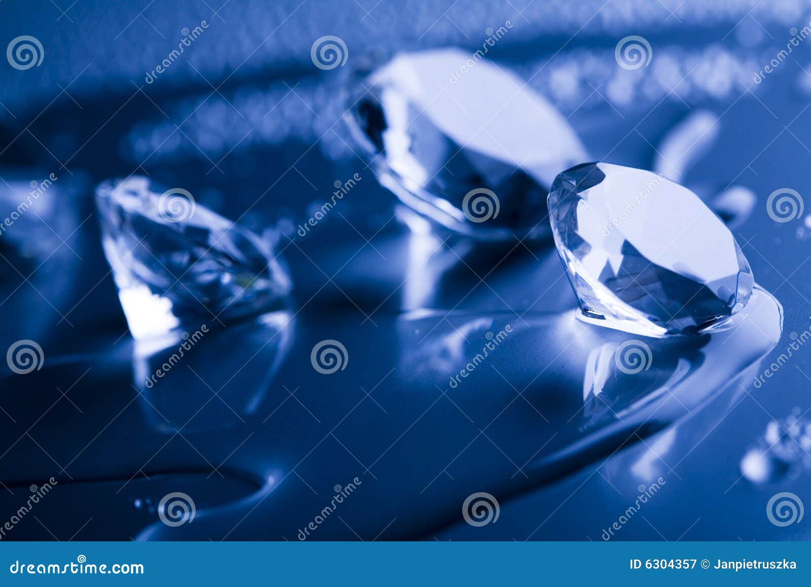 Diamond on blue background stock image. Image of gemstone - 6304357