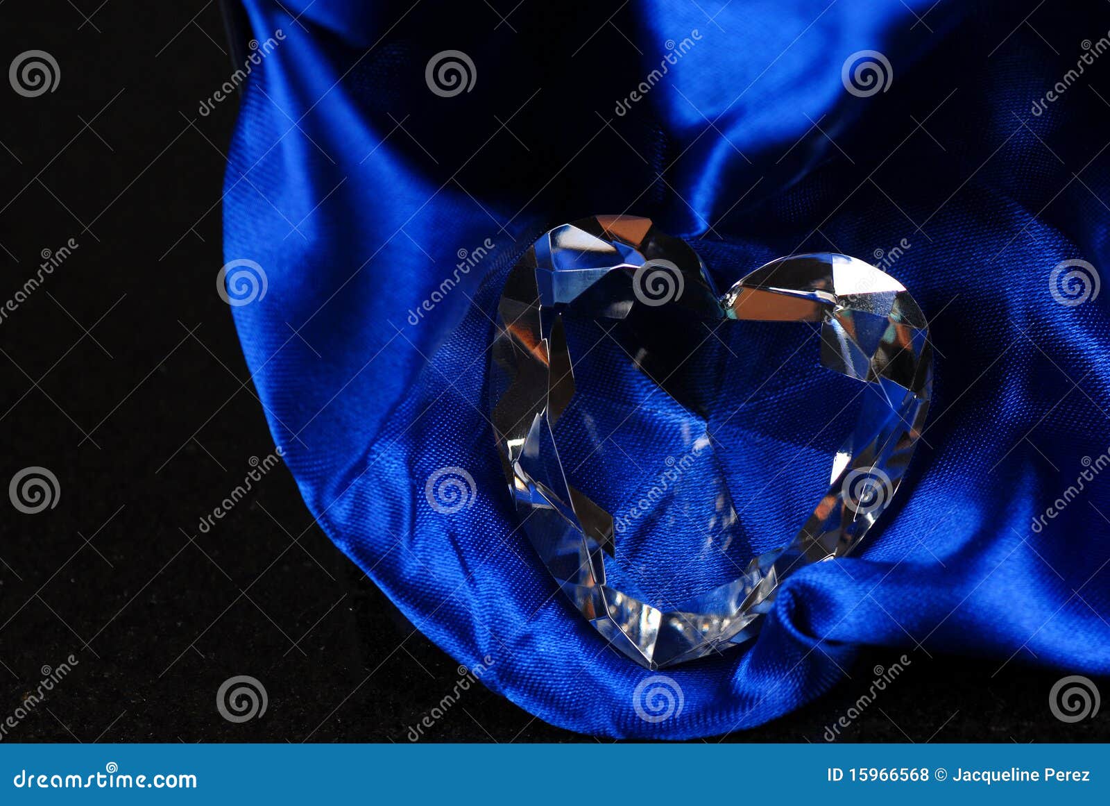 Diamond on blue silk stock photo. Image of wealth, sparkle - 15966568