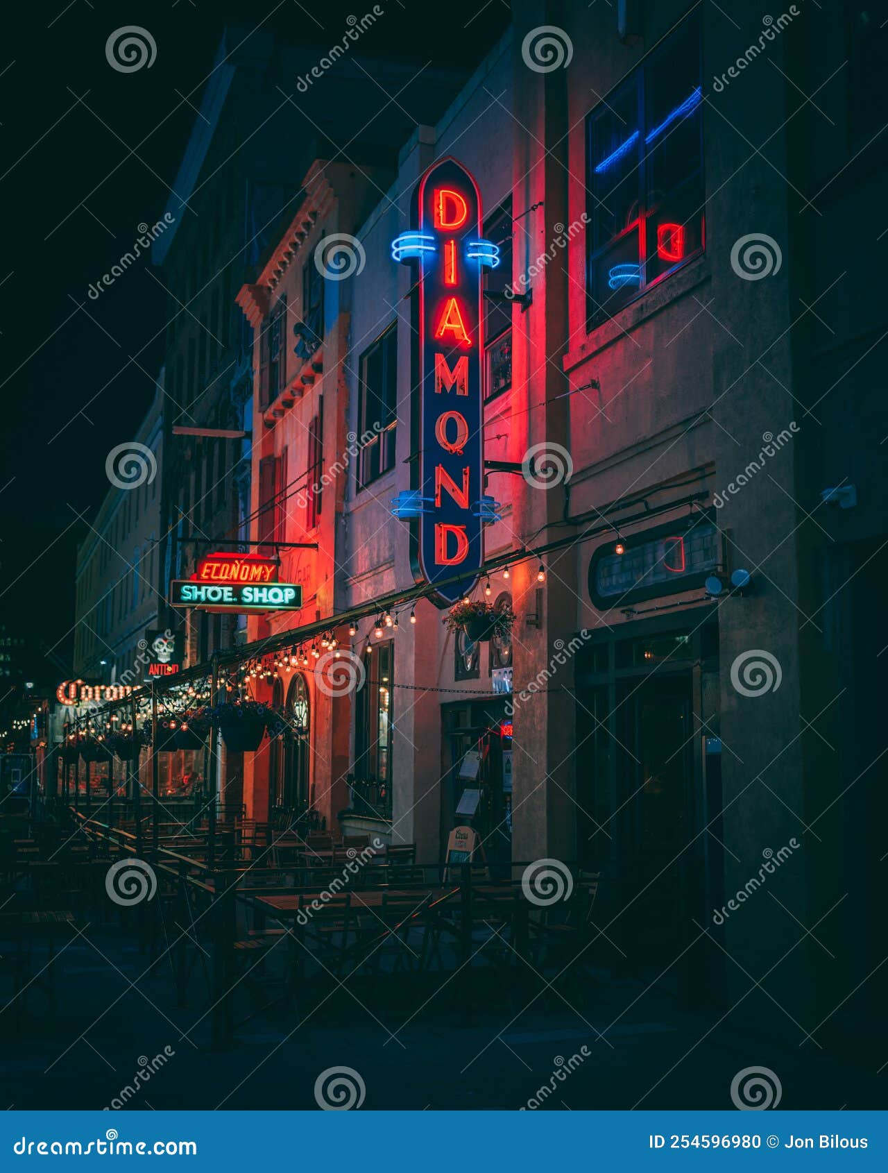 Diamond neon sign at night editorial image. Image of scene - 254596980