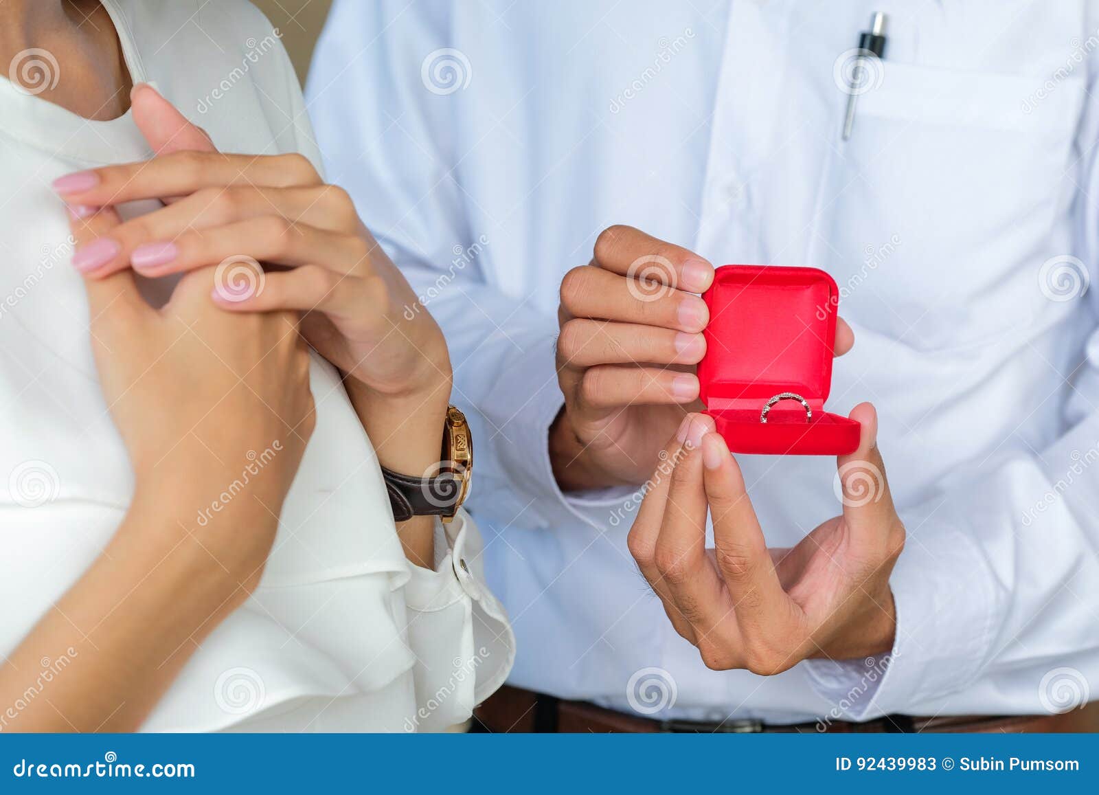 Diamond Ring in Red Box on Hand for Couple Stock Image - Image of ...
