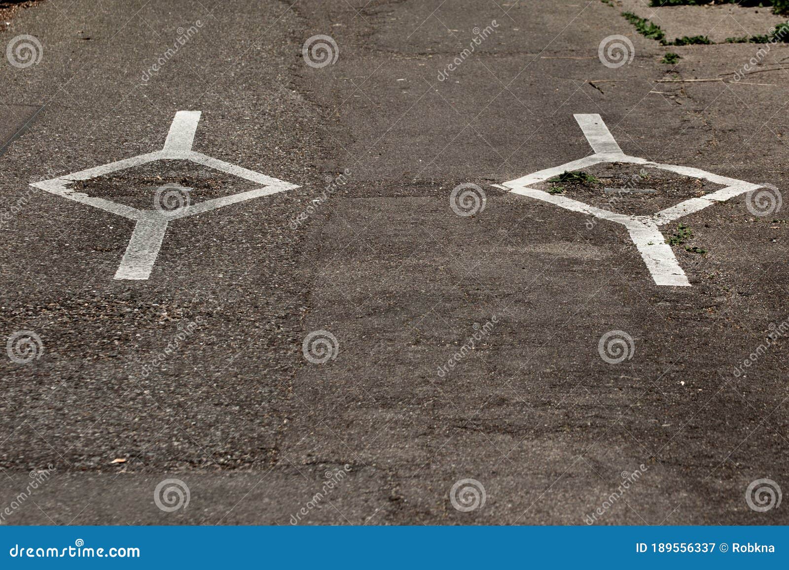 Diamond Shape White Markings on a Road Stock Image - Image of driveway ...