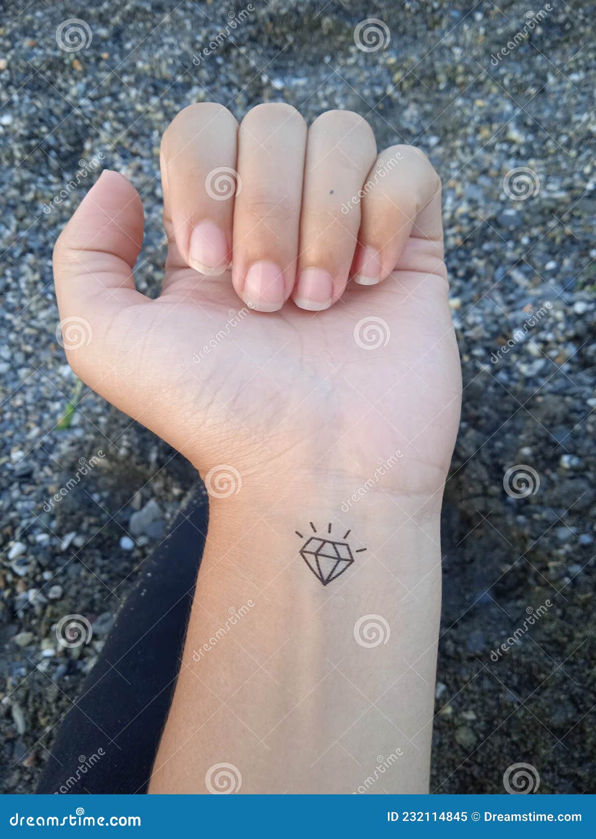 A Diamond Tattoo in the Hand Stock Image - Image of beach, diamond ...