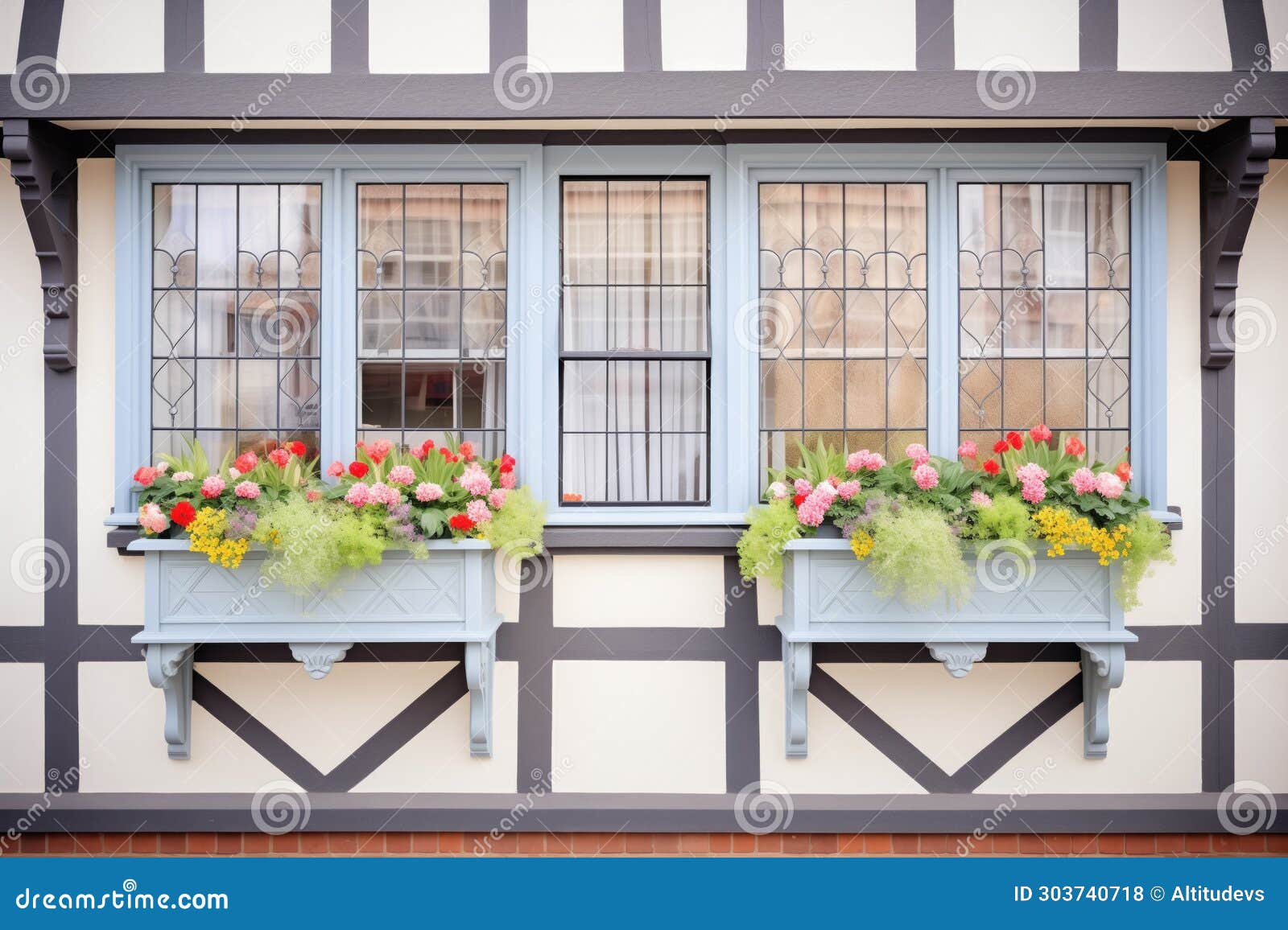 Diamond Windows with Flower Boxes on a Tudor House Stock Photo - Image ...