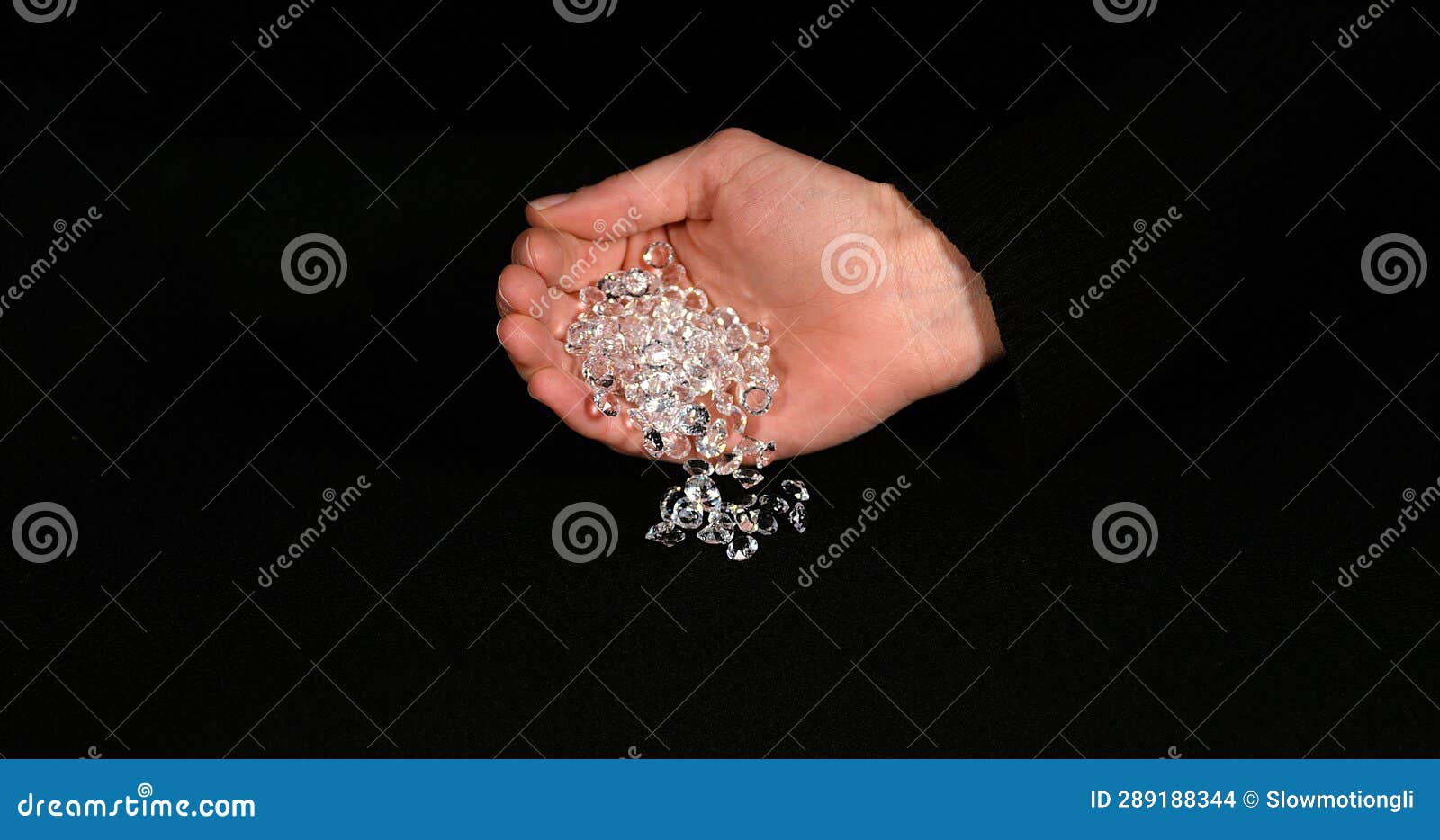 Diamonds Falling into Hand Against Black Background Stock Photo - Image ...