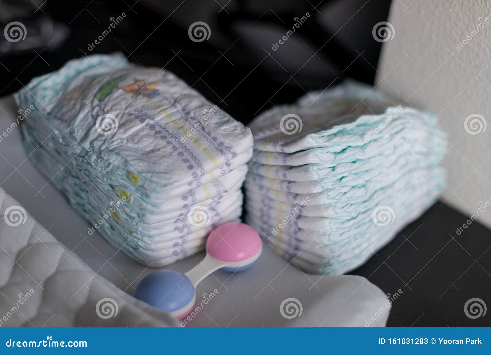 Diapers stacked in a piles stock image. Image of care - 161031283