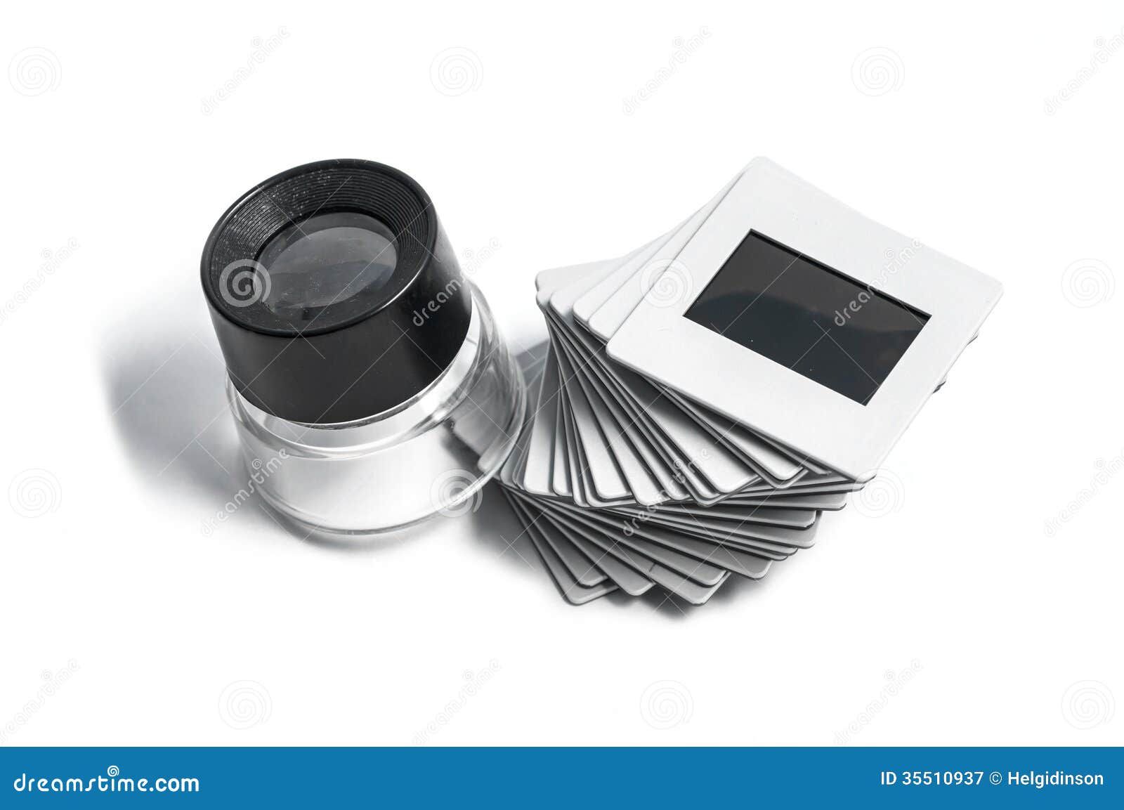 Diapositivas y lupa imagen de archivo. Imagen de cromo - 35510937