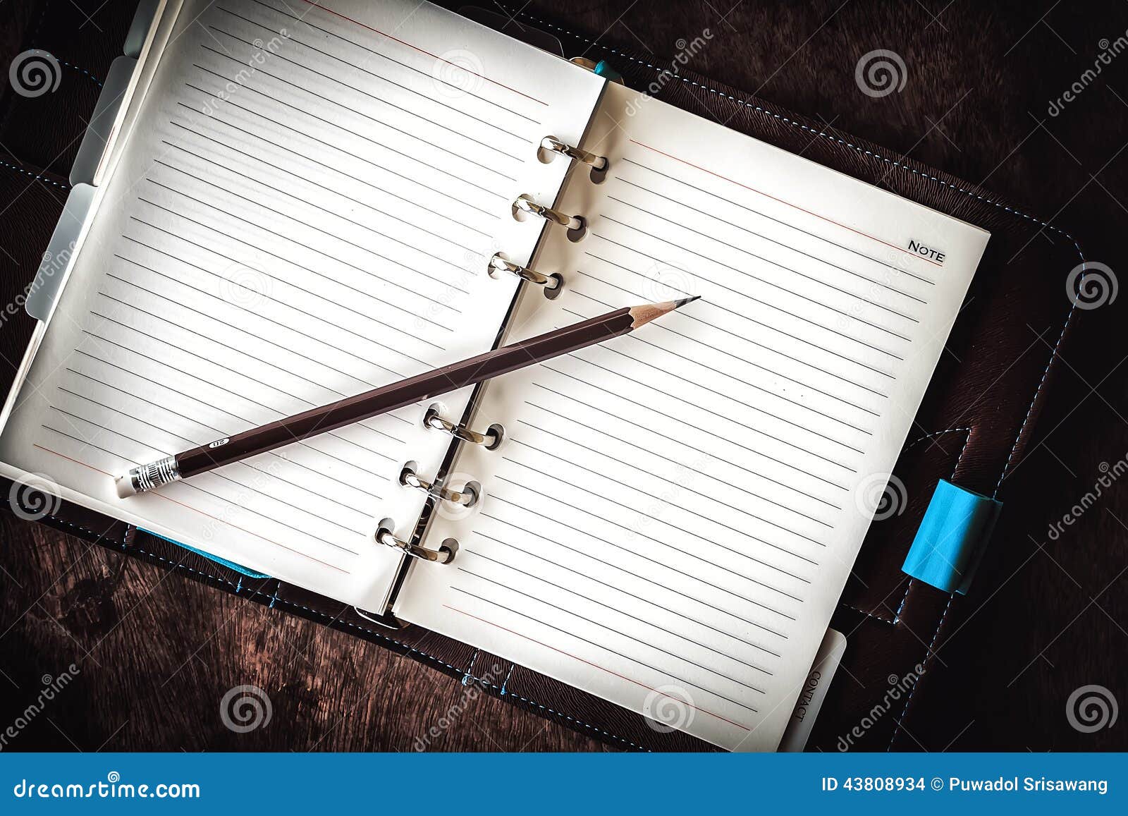 Diary on a wooden table stock photo. Image of calendar - 43808934