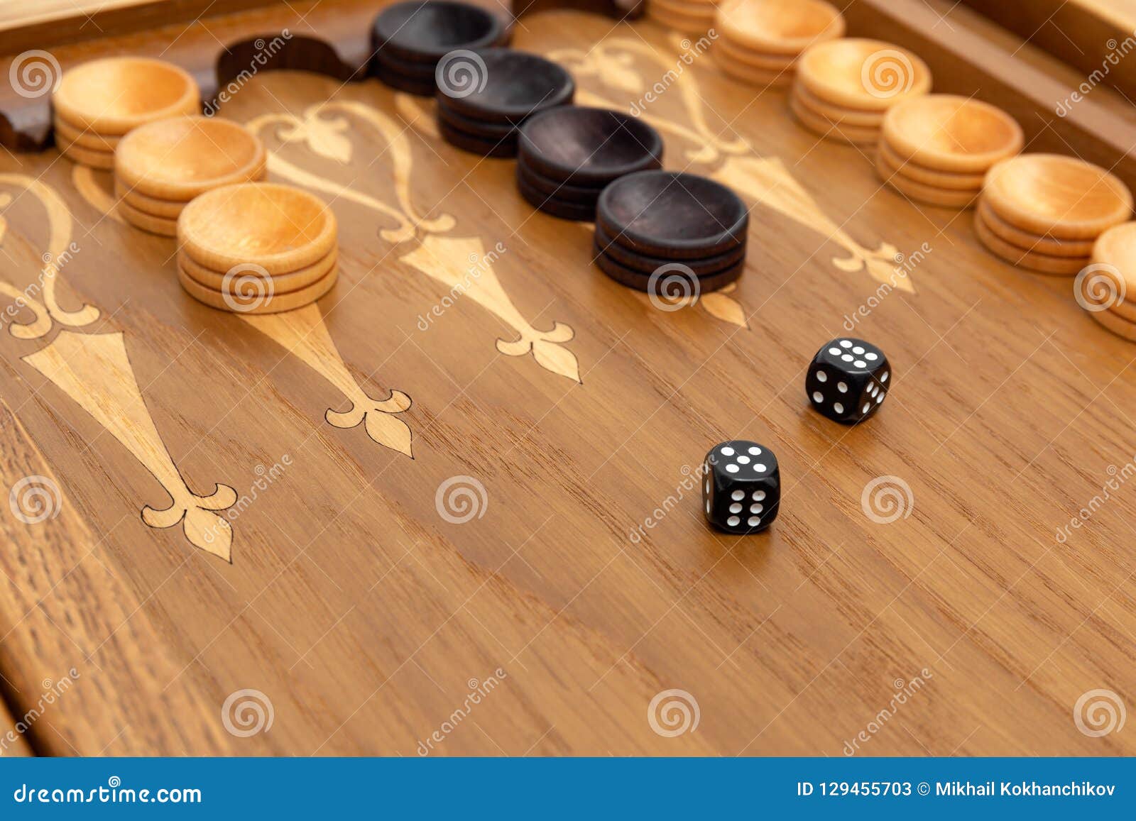 Dice on a backgammon board stock image. Image of challenge - 129455703