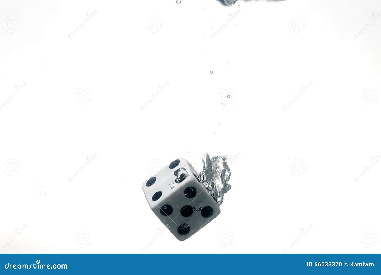 Dice Dropped into the Water, on a White Background. Stock Photo - Image ...