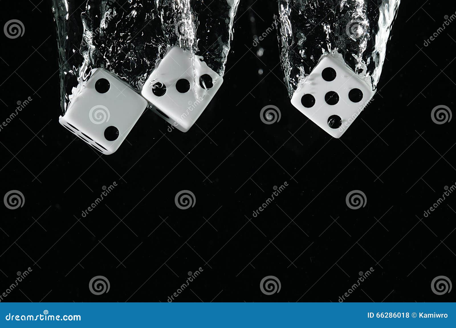 Dice Falling into Water. on a Black Background. Stock Photo - Image of ...
