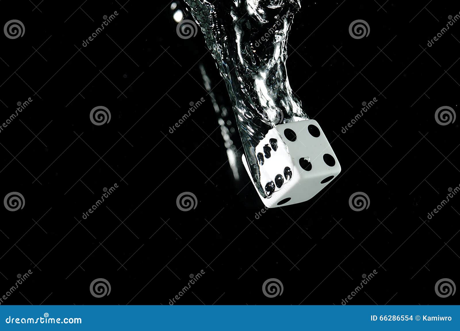Dice Falling into Water. on a Black Background. Stock Photo - Image of ...