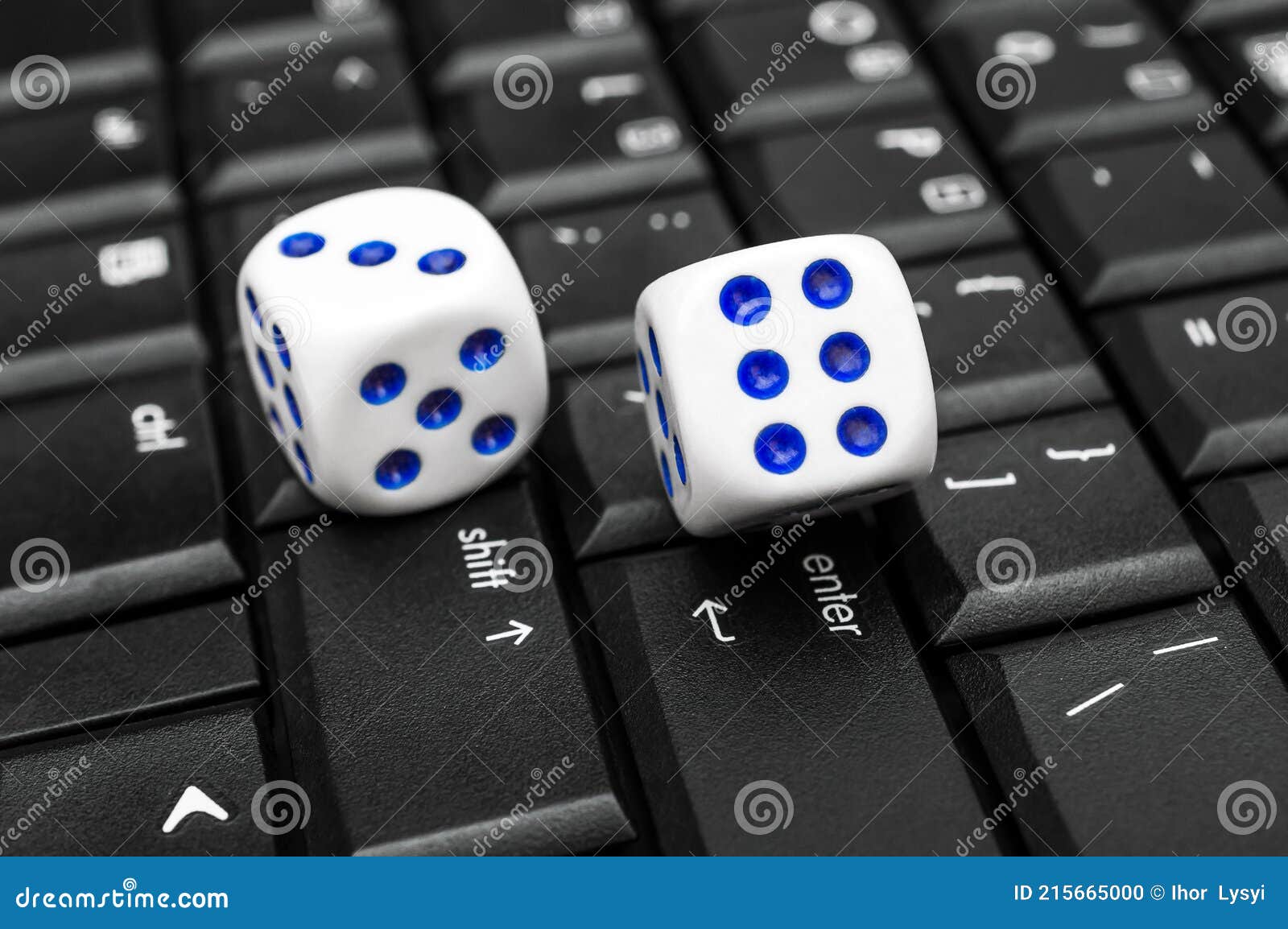 Dice on the Laptop Keyboard Stock Photo - Image of wealth, luck: 215665000