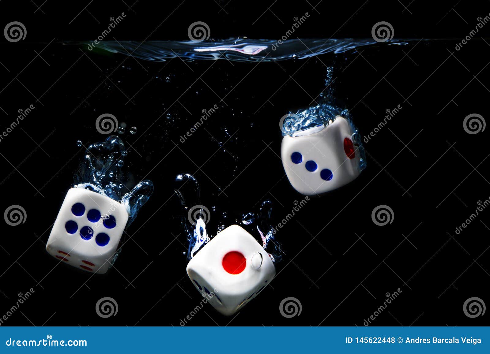 Three Dices with the Numbers Six, One and Three Faces in the Water with ...