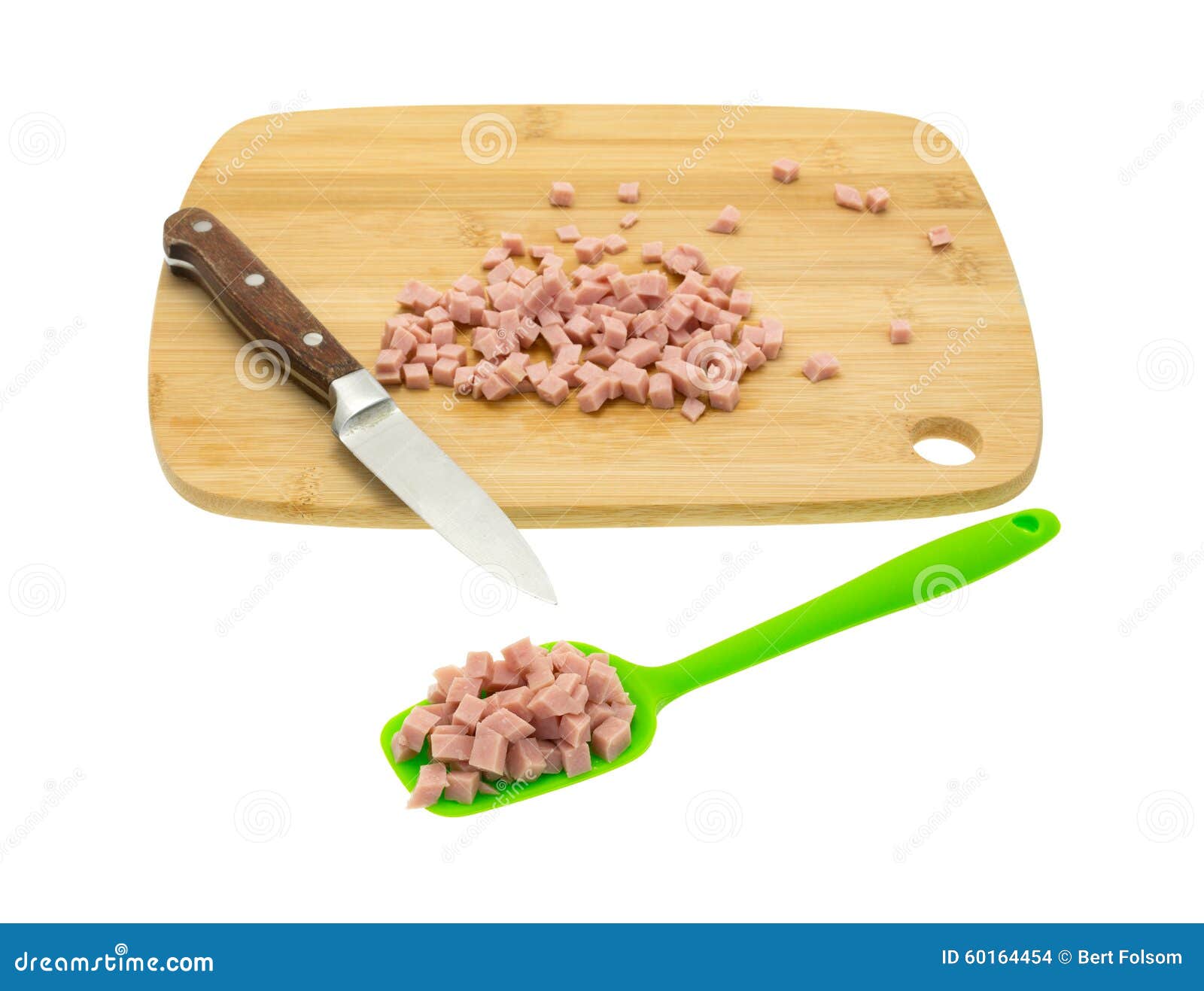 Diced Ham on Cutting Board and Green Spoon Stock Photo - Image of ...