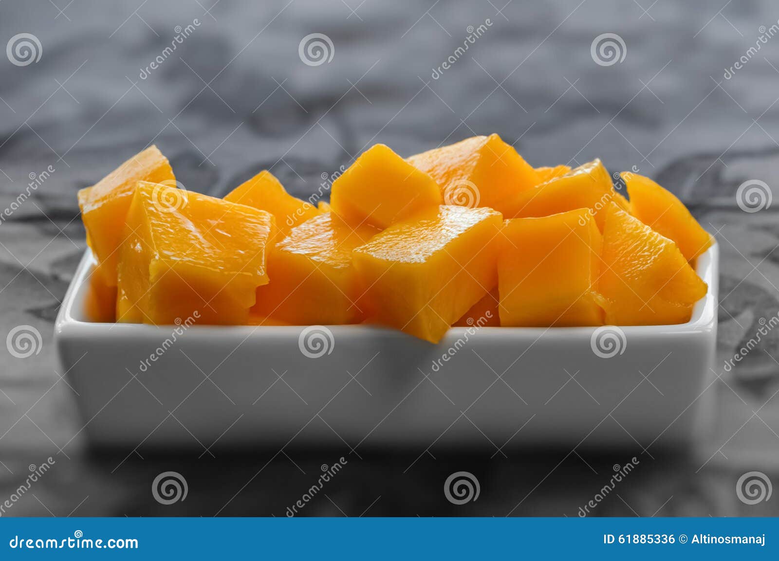 Diced Mango Cubes Placed and Served on a White Dish Closeup Stock Photo ...