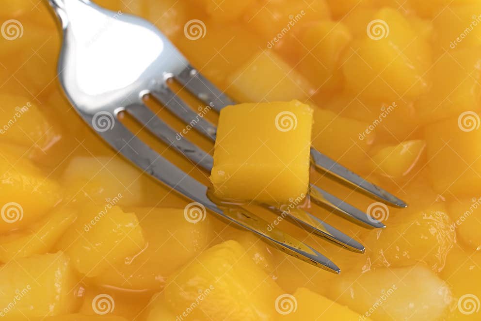 Diced mango on a fork stock image. Image of natural, tropical - 78686355