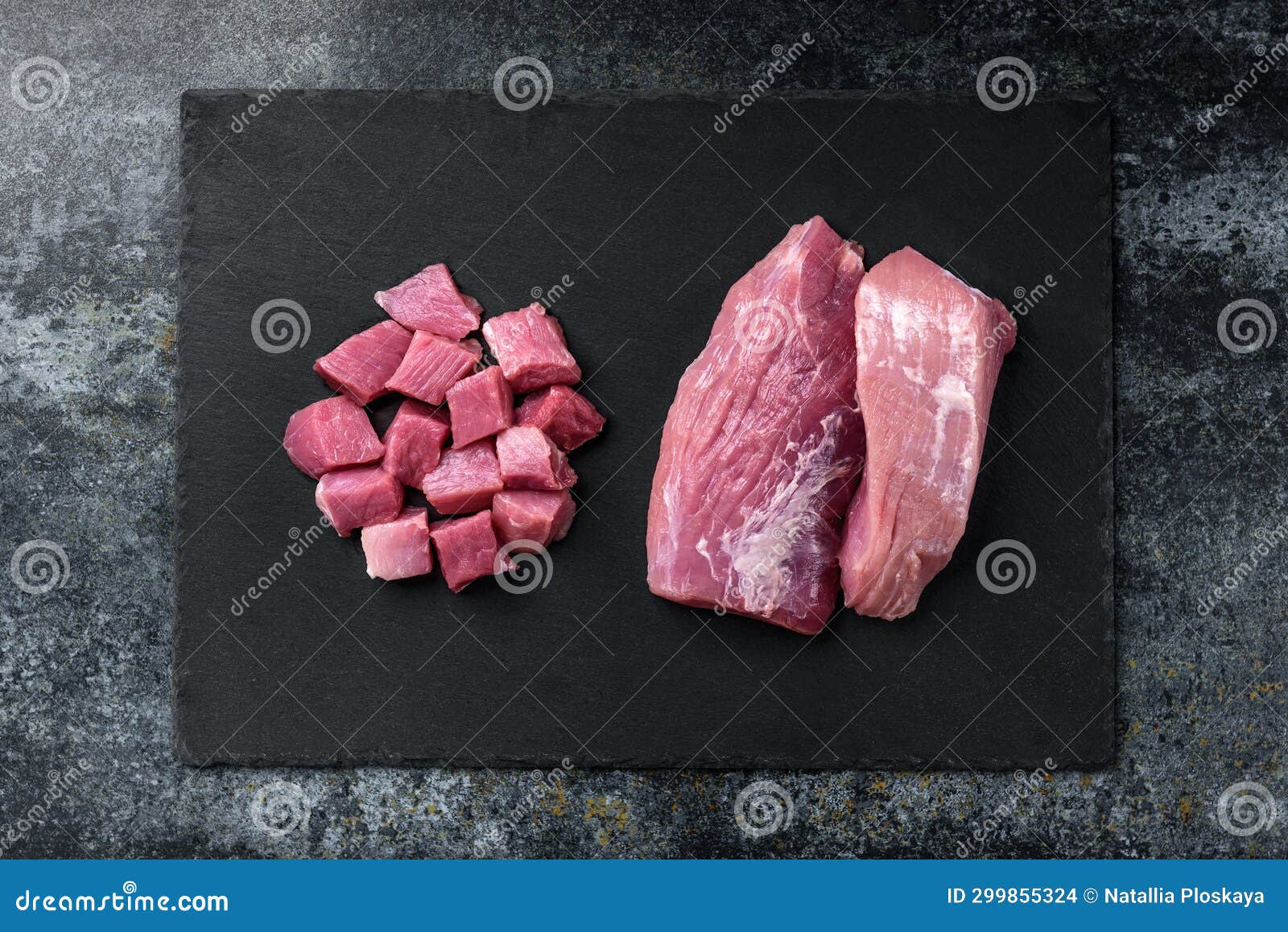 Diced Raw Pork Meat with on Slate Board on Black Background. Stock ...