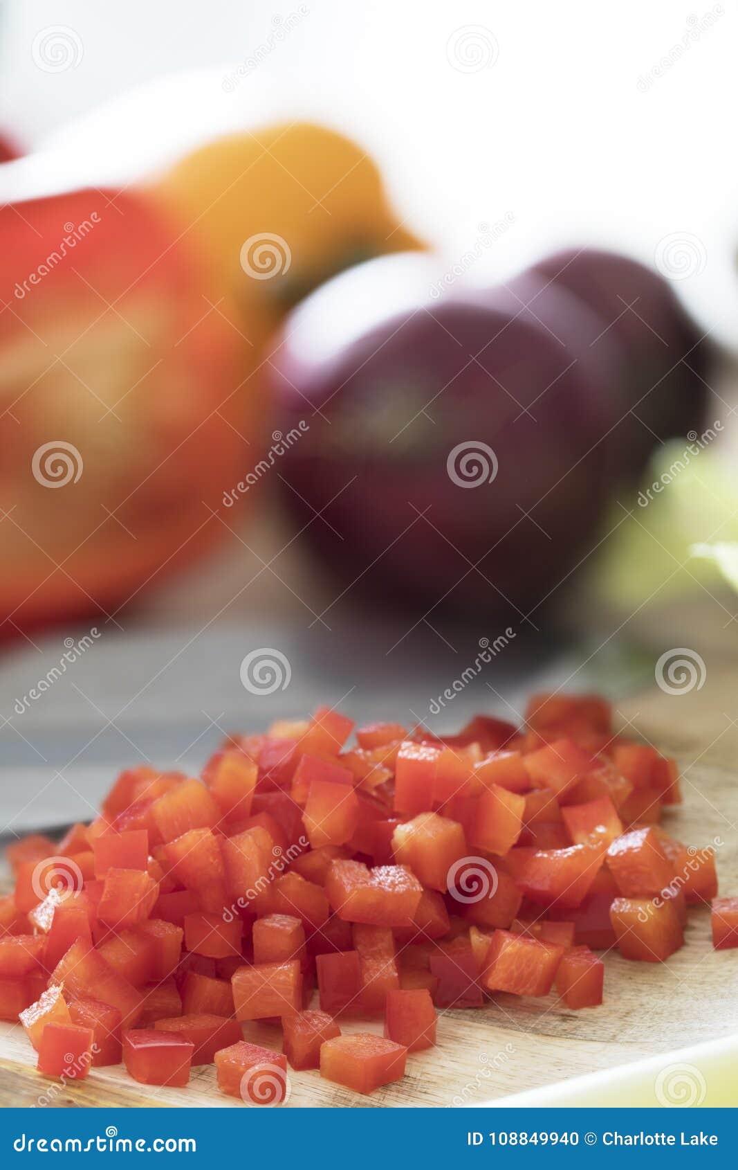Diced Red Bell Peppers Vertical Stock Photo - Image of gourmet, healthy ...