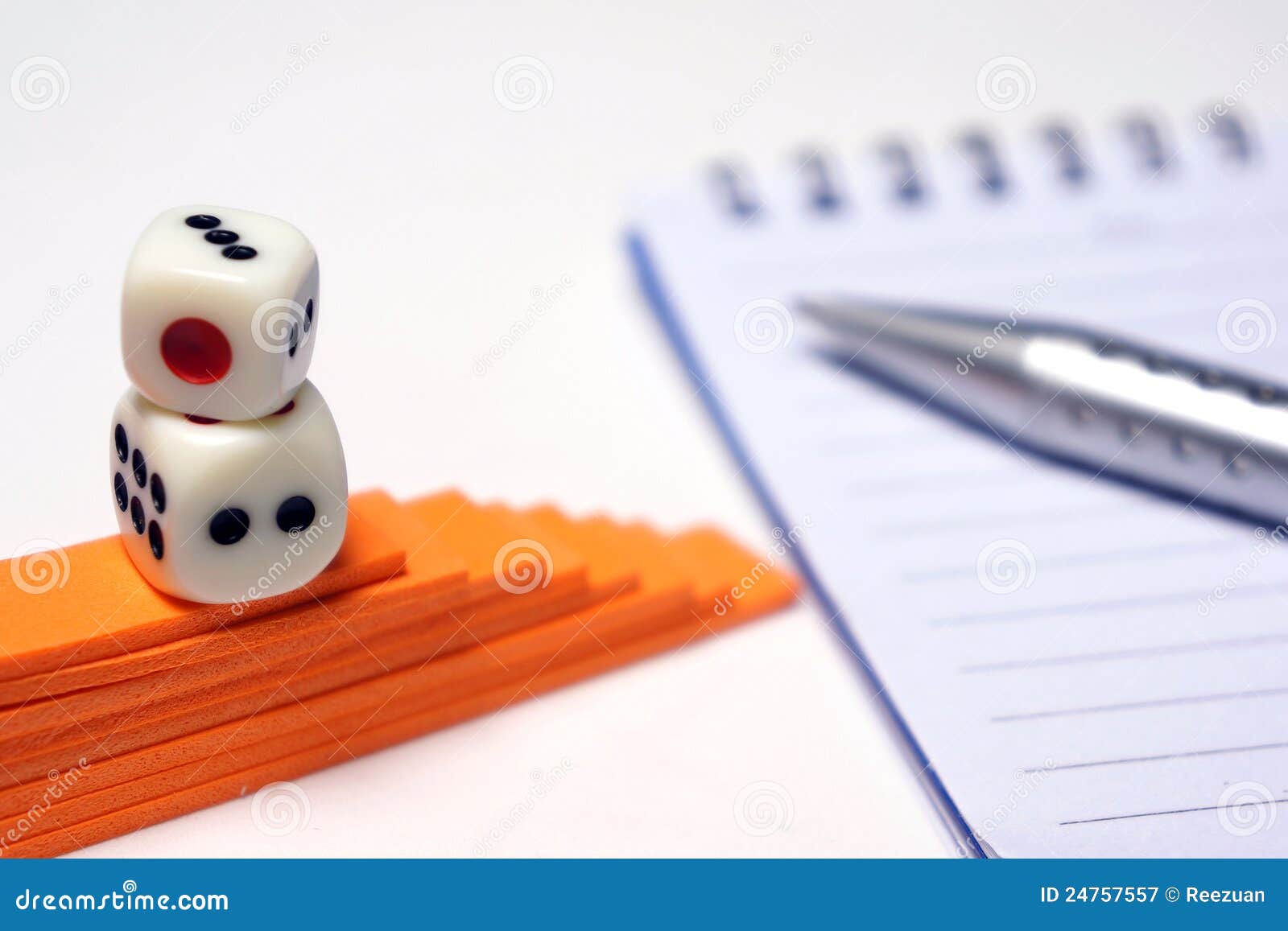 Dices with pen and notepad stock image. Image of management - 24757557