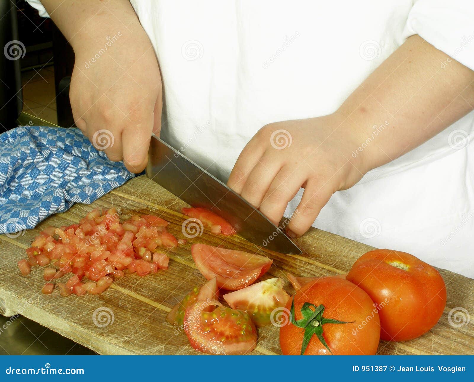 Dicing tomatoes stock image. Image of working, ingredients - 951387