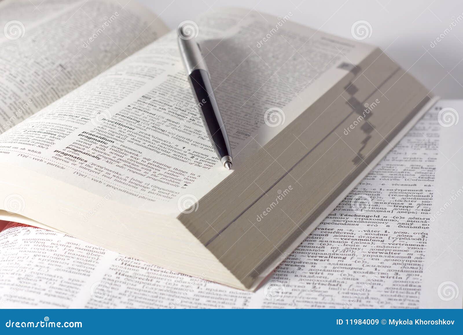 Dictionary with a pen stock image. Image of notebook - 11984009