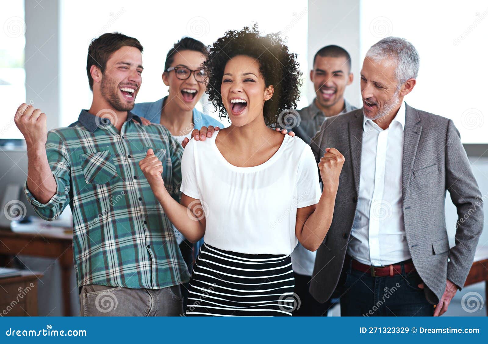 We Did it Again Team. Portrait of a Group of Colleagues Cheering while ...