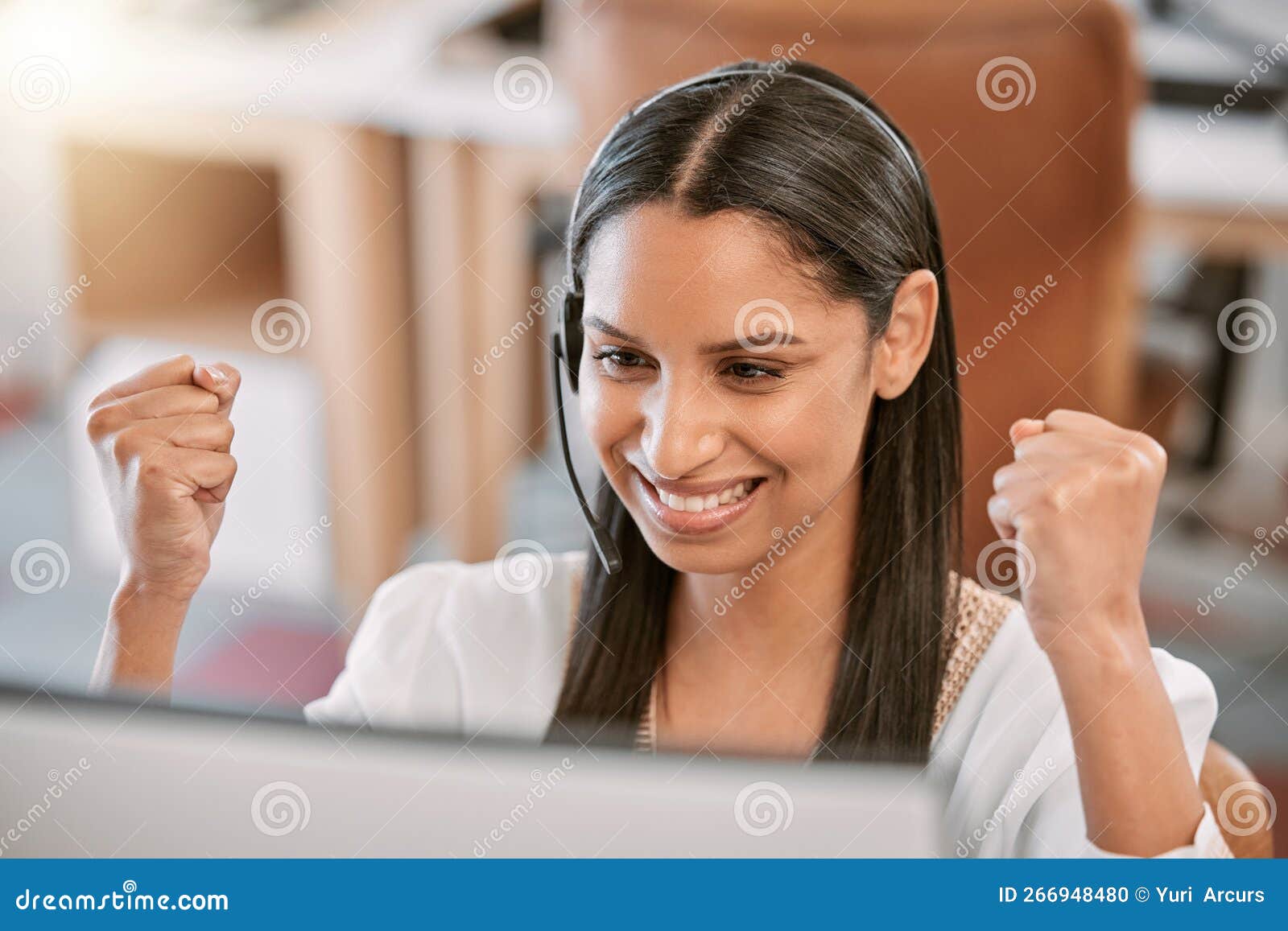 We Did it. an Attractive Young Call Center Agent Wearing a Headset and ...