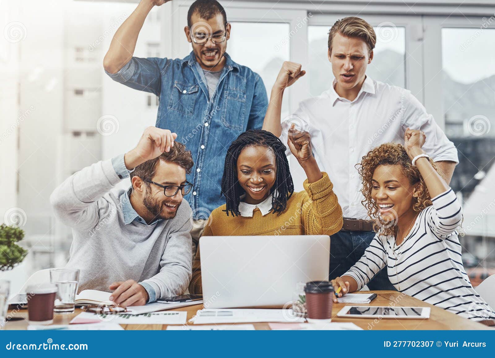 We Did it. Colleagues Cheering at Something on a Laptop Screen. Stock ...