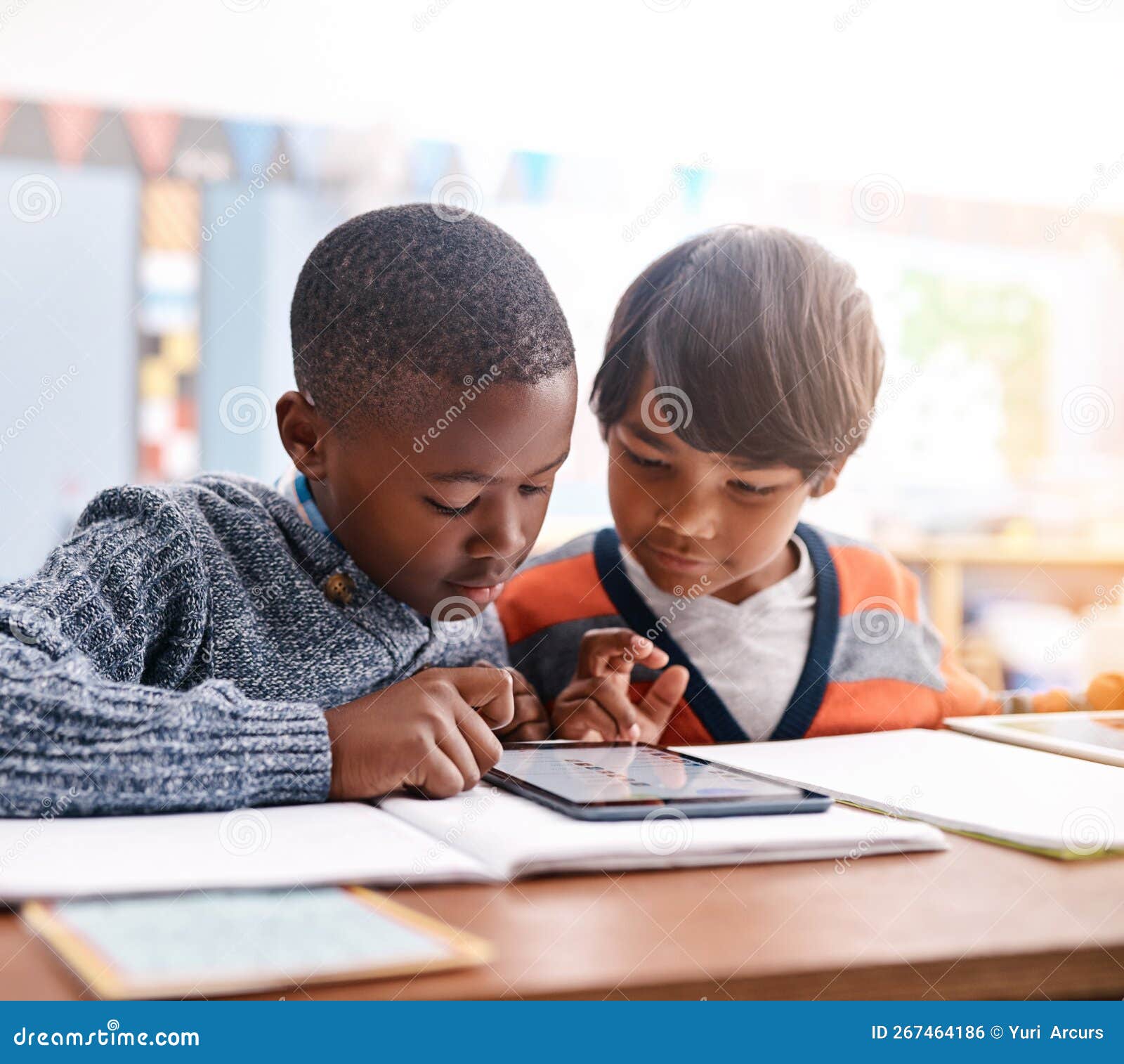 Did You See this. Two Elementary School Children Browsing on a Digital ...