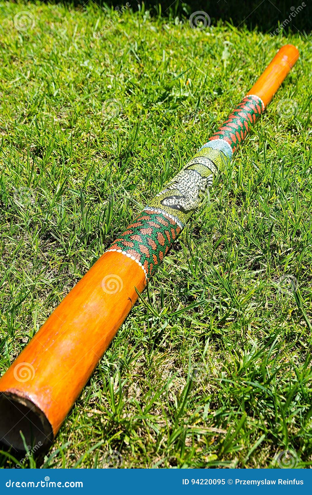 Didgeridoo on the grass stock image. Image of australia - 94220095