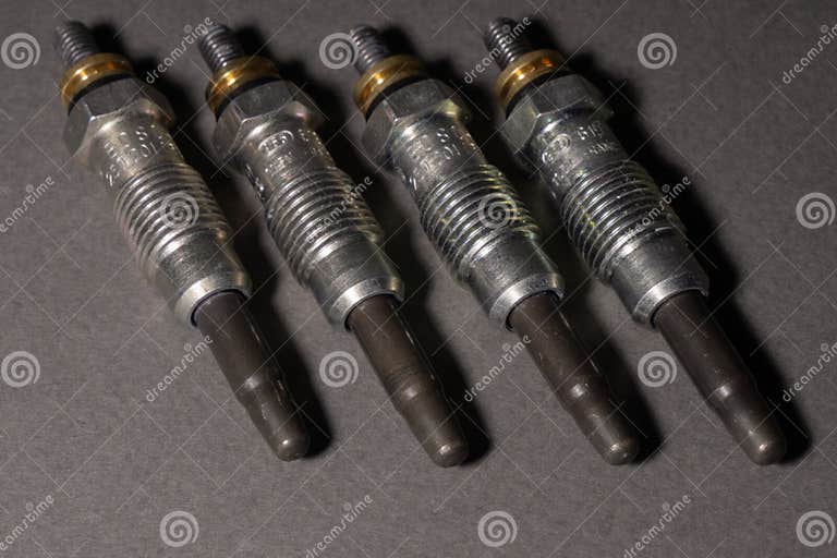 Diesel Engine Glow Plug on a Gray Background. Replaceable Part of a ...
