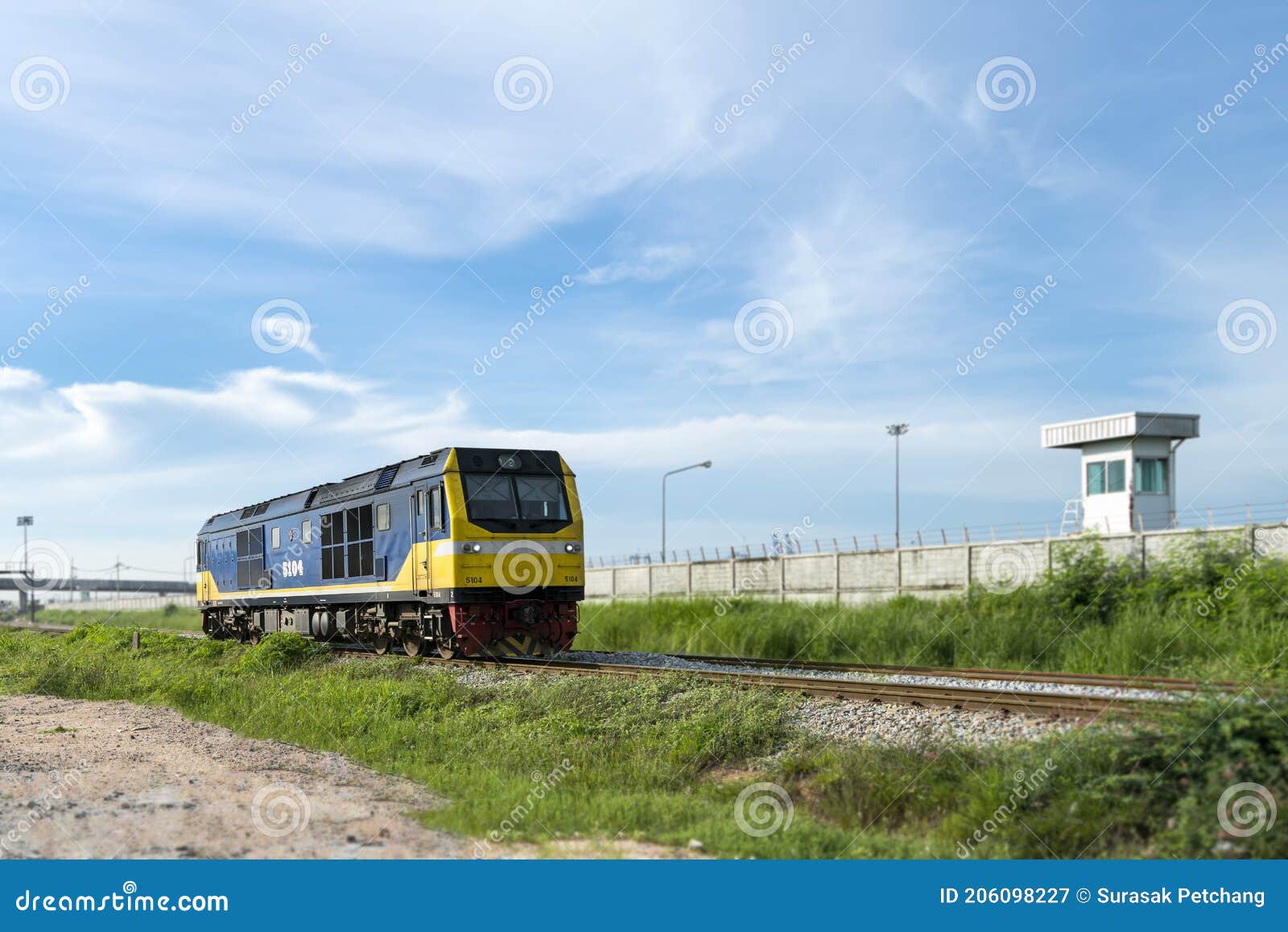 Diesel Engine Train Head Run on Railway Track with Cloudy and Blue Sky ...