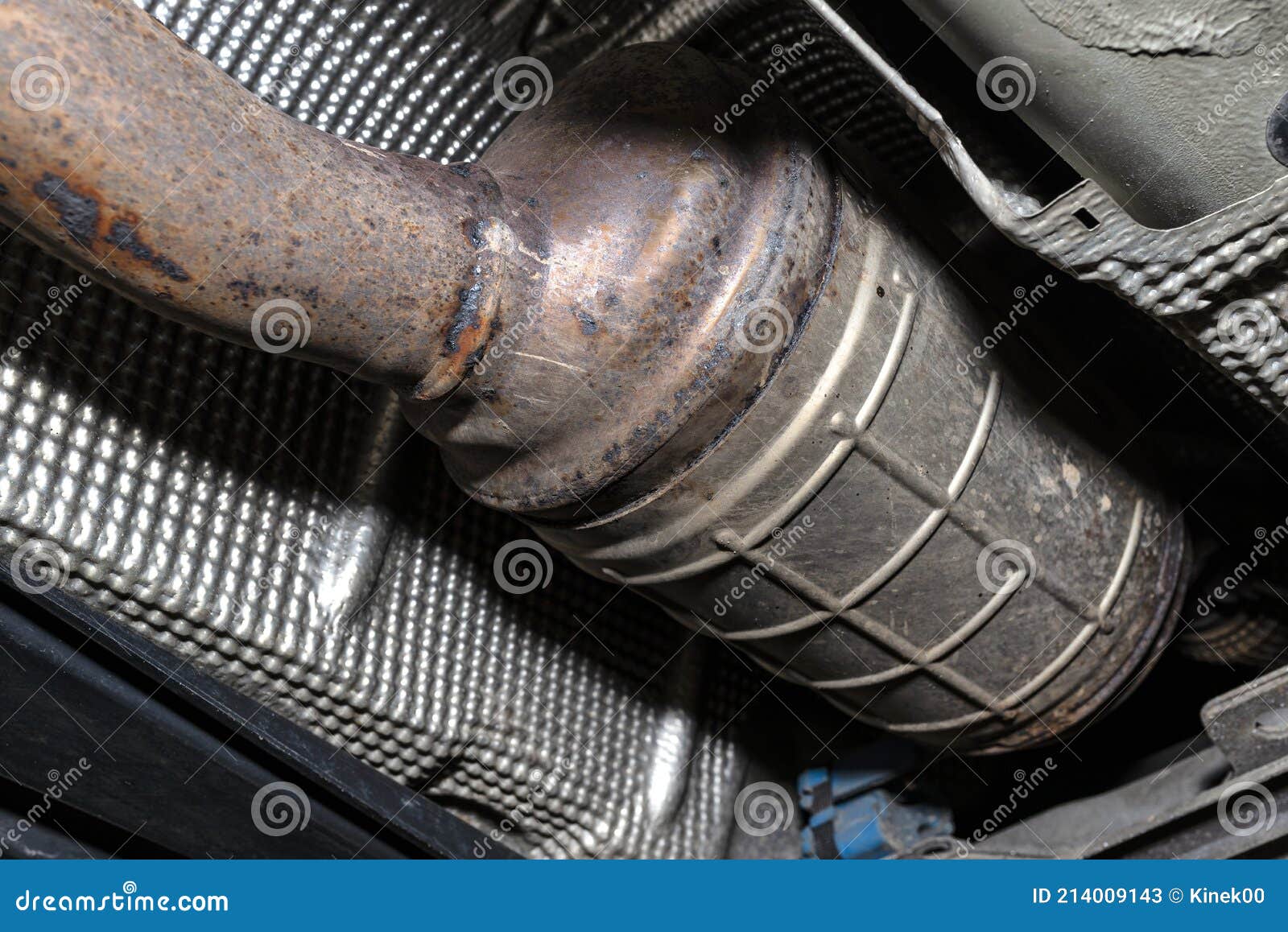 A Diesel Particulate Filter in the Exhaust System in a Car on a Lift in ...