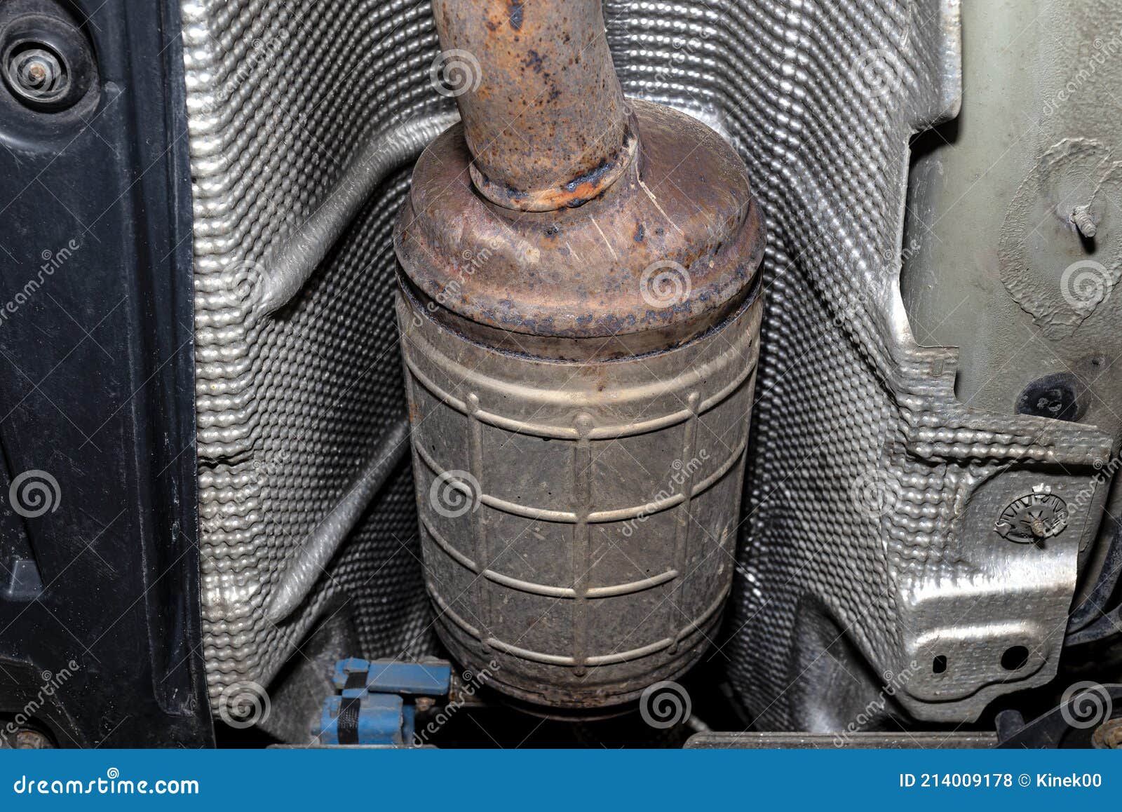 A Diesel Particulate Filter in the Exhaust System in a Car on a Lift in ...