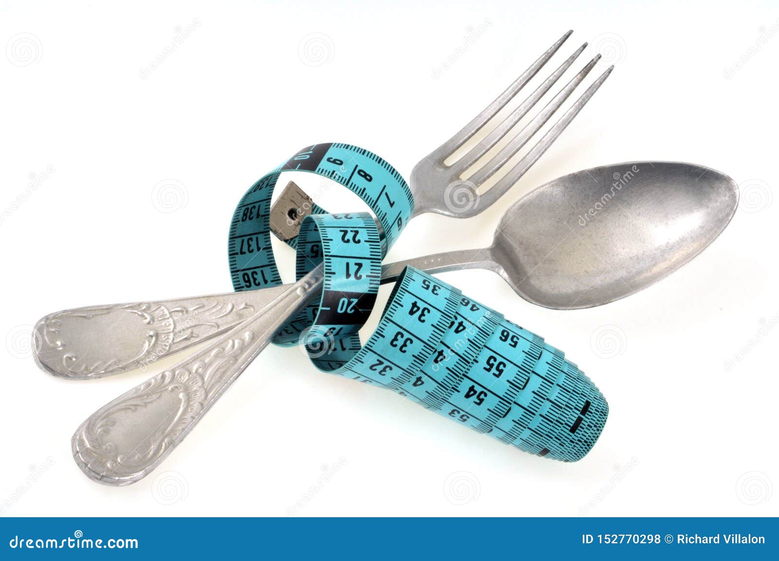 Cutlery Surrounded by a Seamstress Meter on a White Background Stock ...