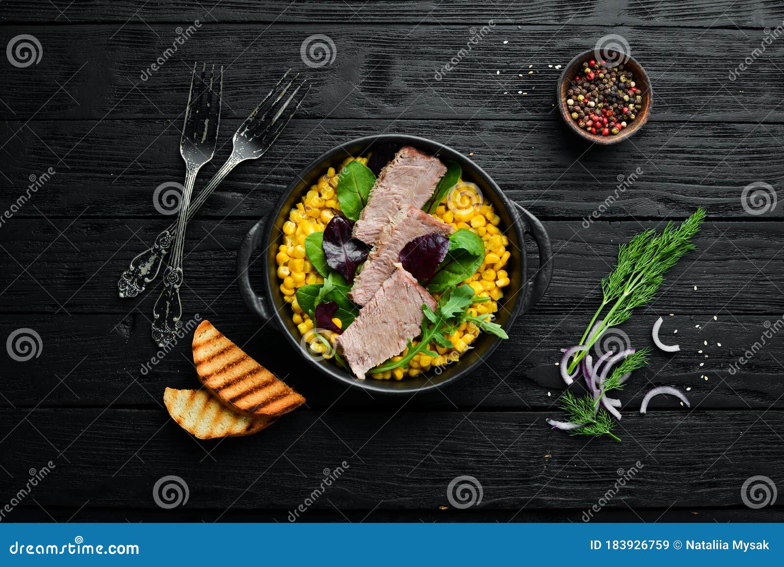Dietary Nutrition. Boiled Veal with Corn and Spinach in a Black Bowl ...