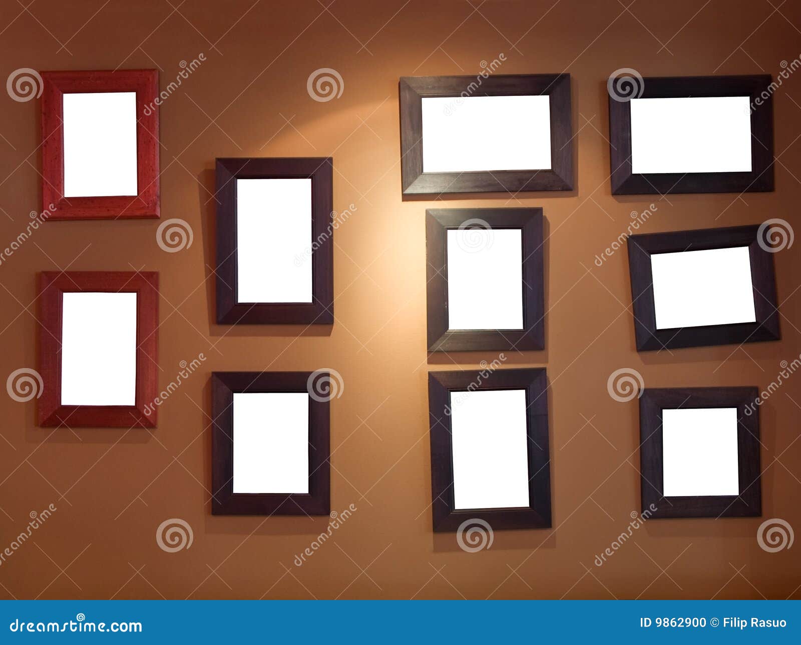 Diez marcos en la pared foto de archivo. Imagen de blanco - 9862900