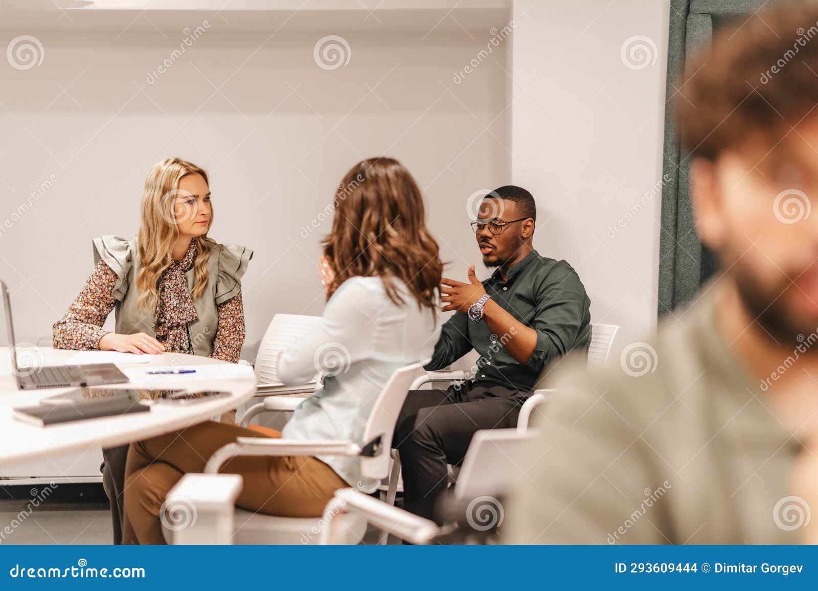 Multiracial, Inter-generational Coworkers Learning Together at Modern ...