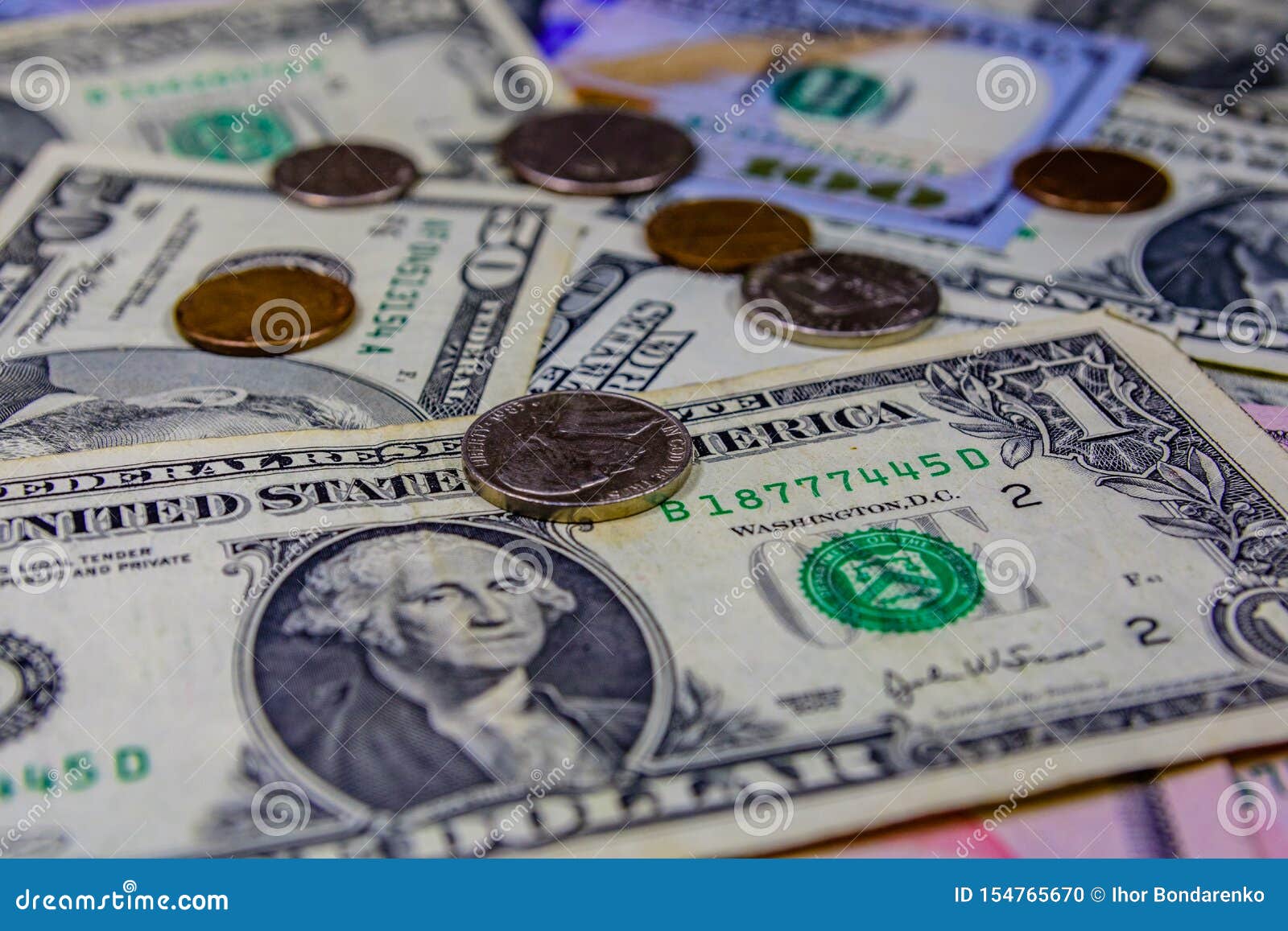 Different American Cent Coins Over the Dollar Banknotes Stock Photo ...