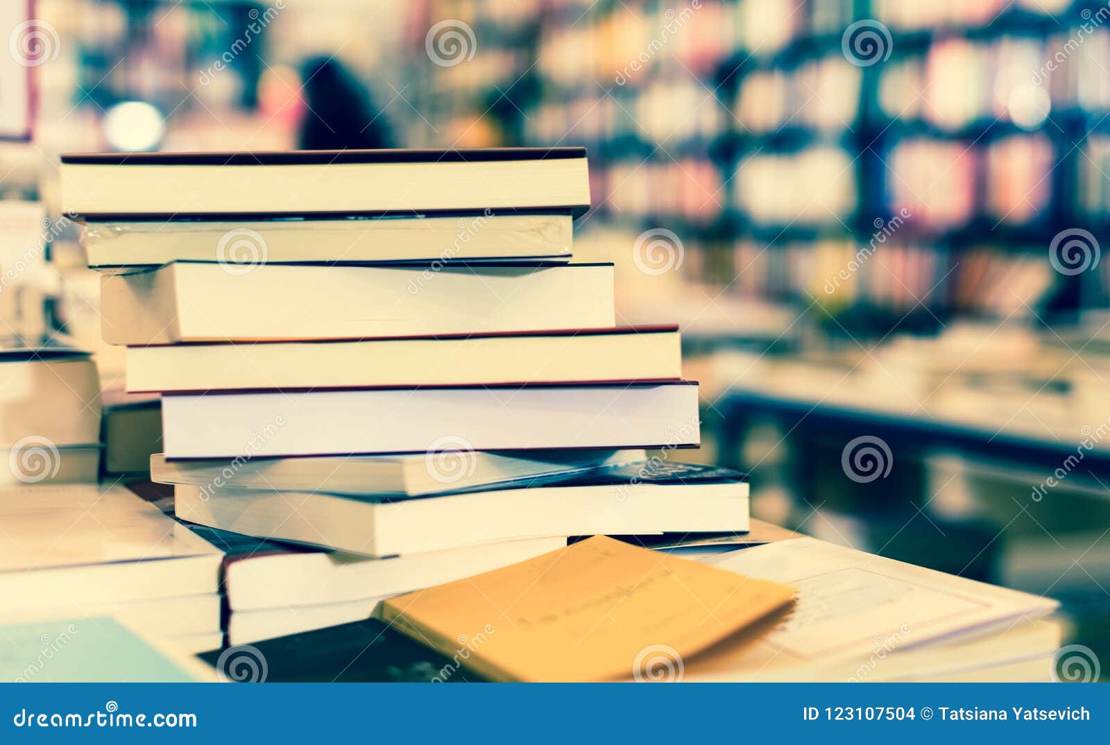 Different Books Lying on Table in Library Stock Photo - Image of books ...