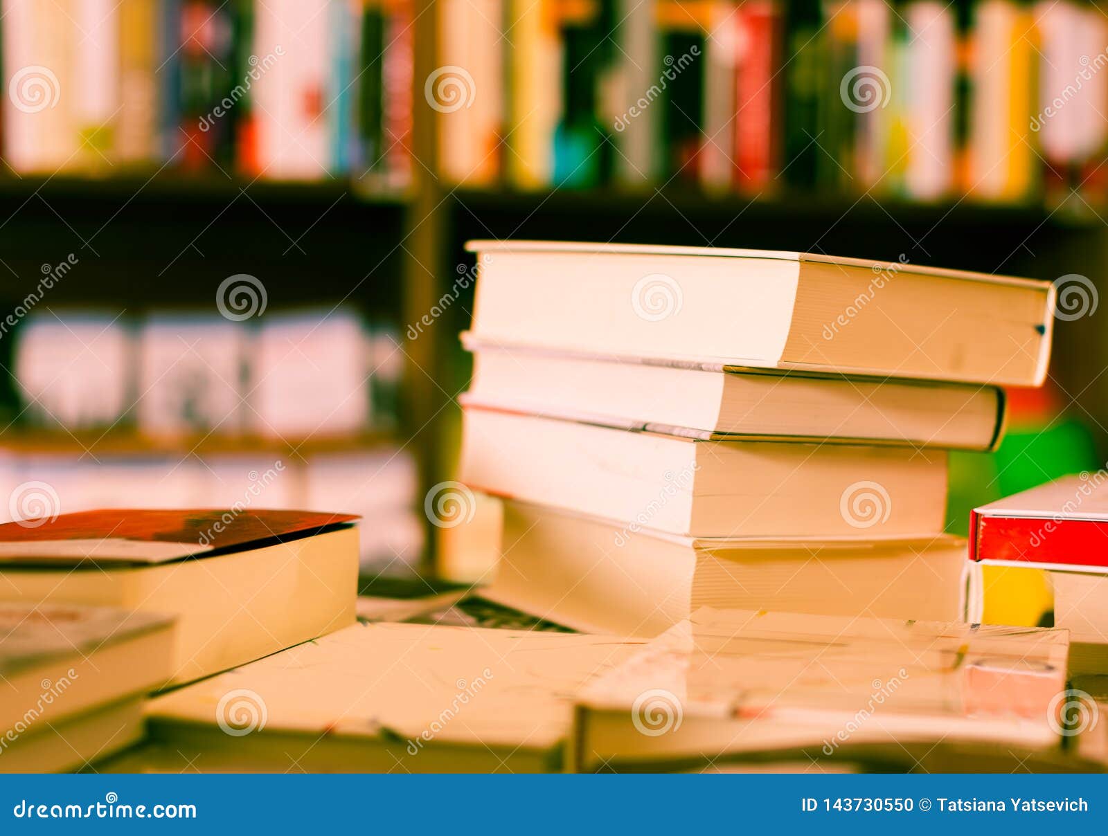 Different Books Lying on Table in Library Stock Photo - Image of ...