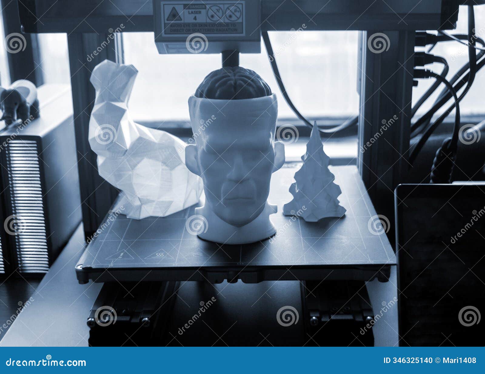 Different Art Models Printed on a 3D Printer. Models of a Prototype ...