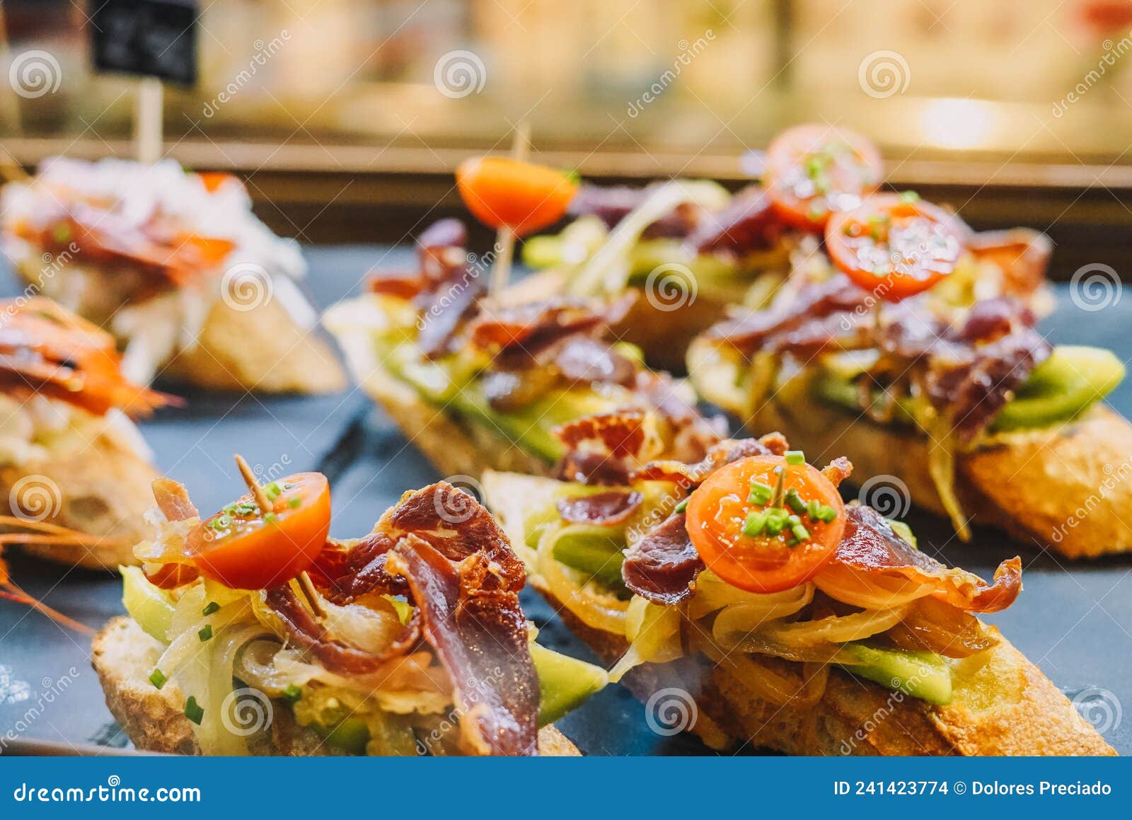 Different Assorted Canapes of Bread with Crab, Ham and Vegetables Stock ...