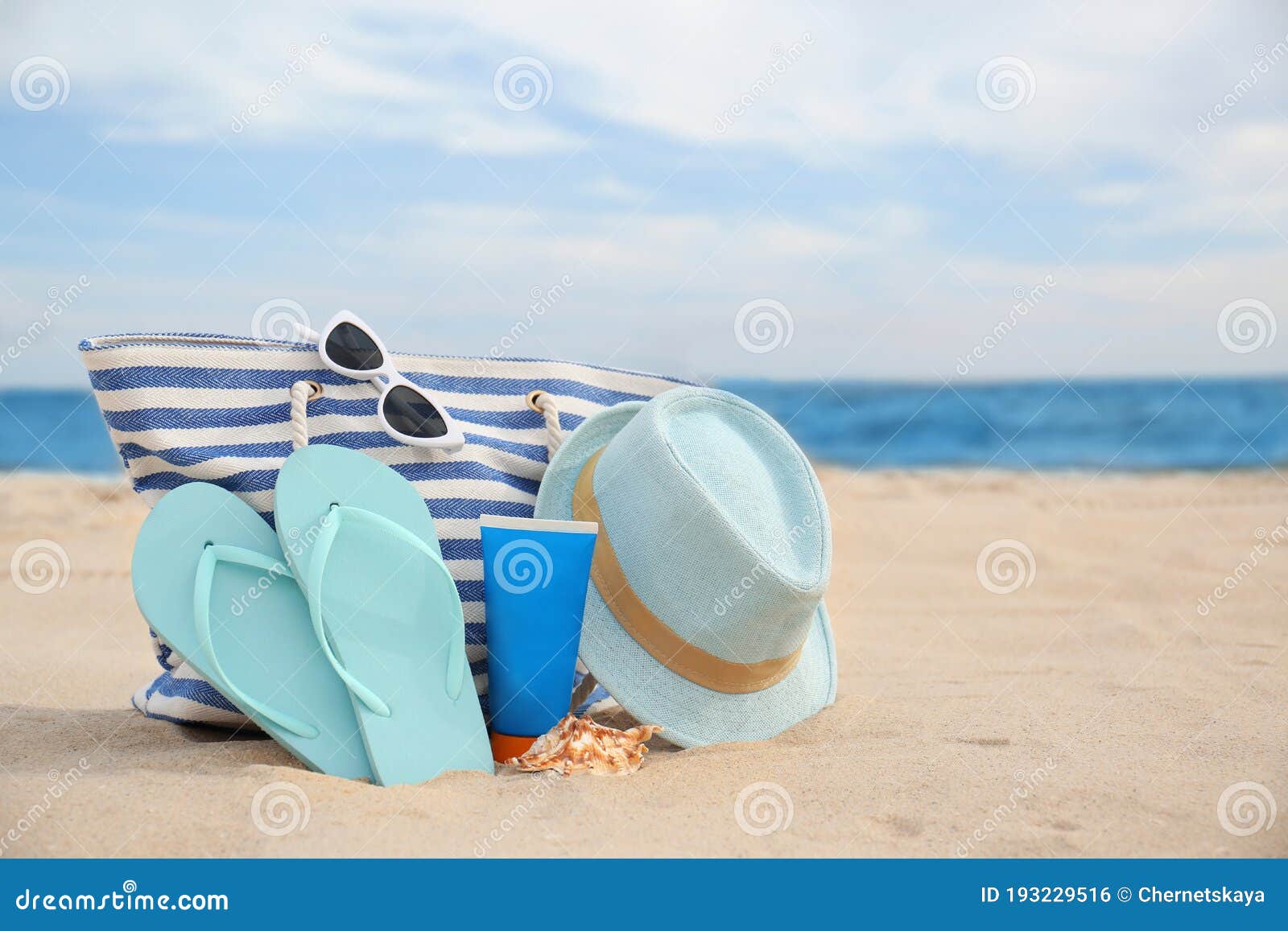 Different Beach Objects on Sand Near Sea Stock Photo - Image of objects ...