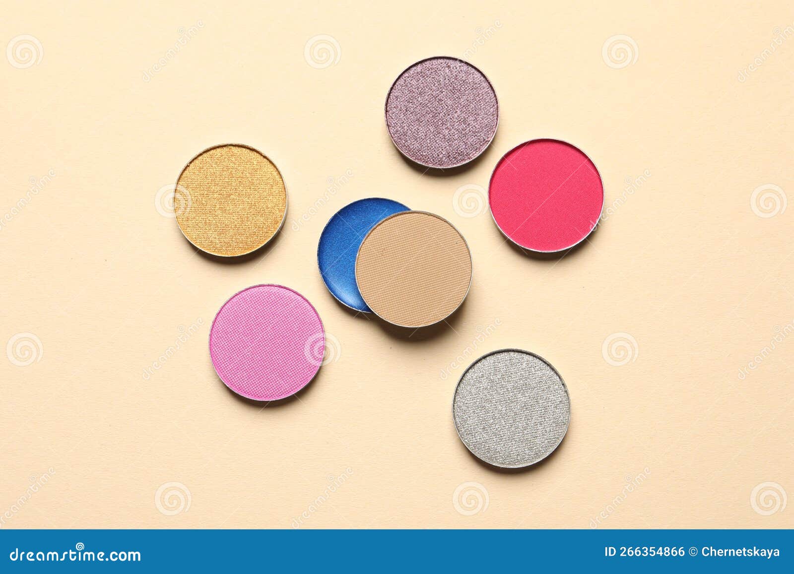 Different Beautiful Eye Shadows on Beige Background, Flat Lay Stock ...
