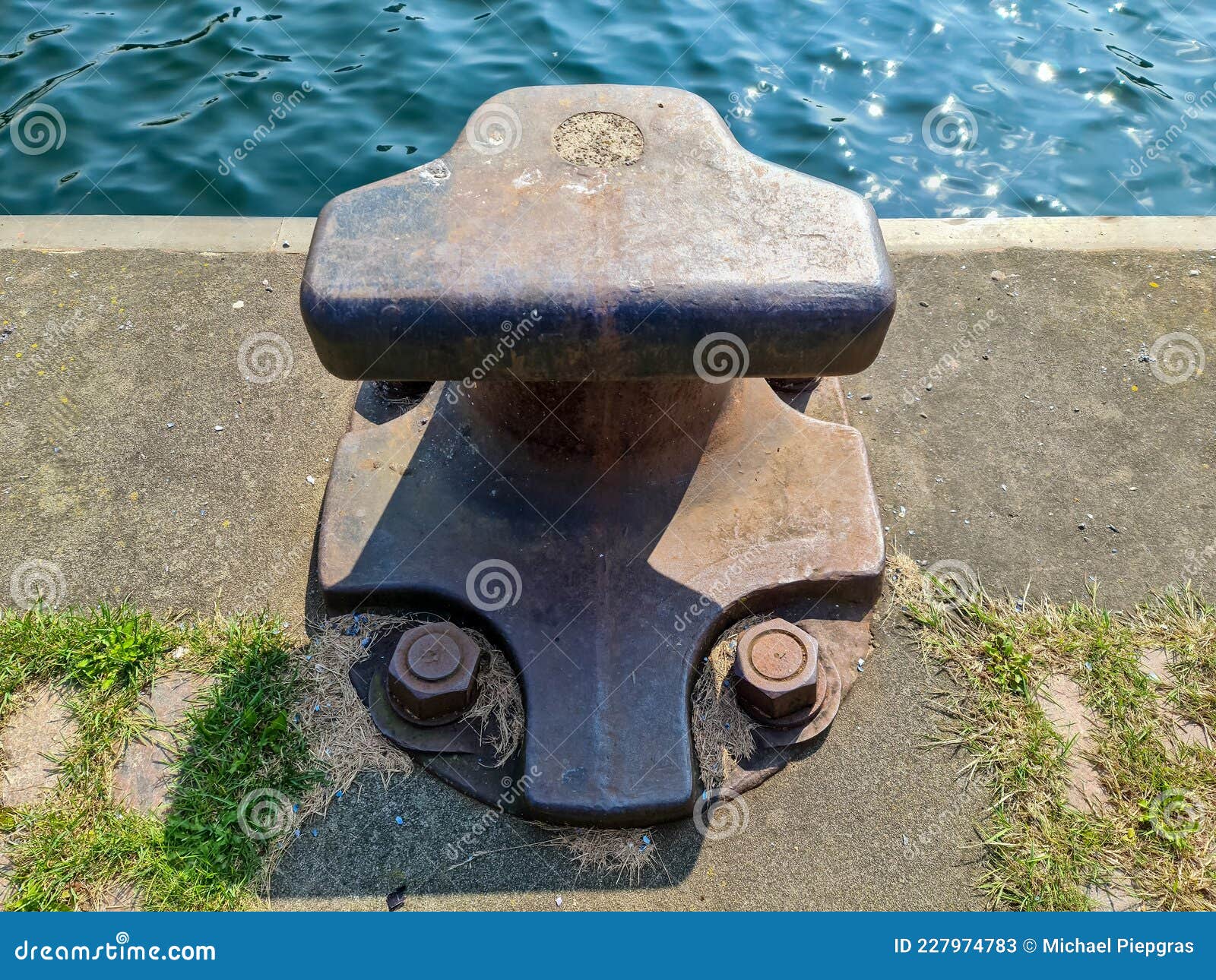 Different Bollards in Front of the Water at the Port of Kiel Stock ...