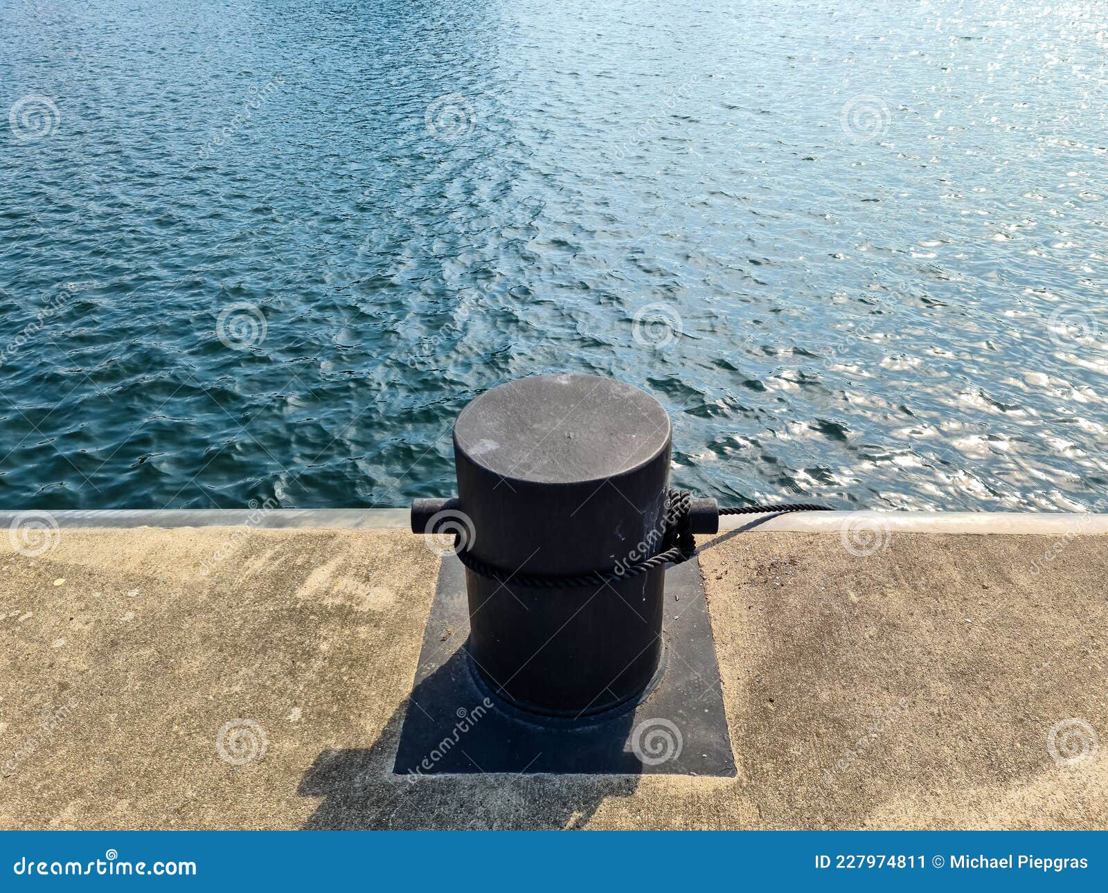 Different Bollards in Front of the Water at the Port of Kiel Stock ...