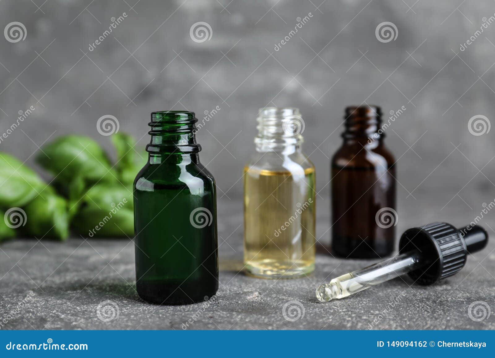 Different Bottles with Essential Oils and Dropper Stock Photo - Image ...